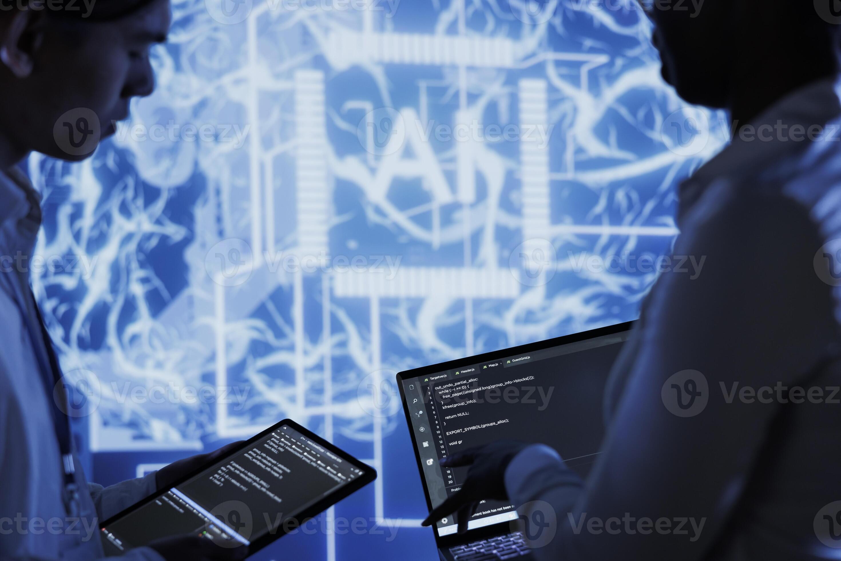 Hardworking Colleagues Write Code On Tablet And Laptop To Visualize