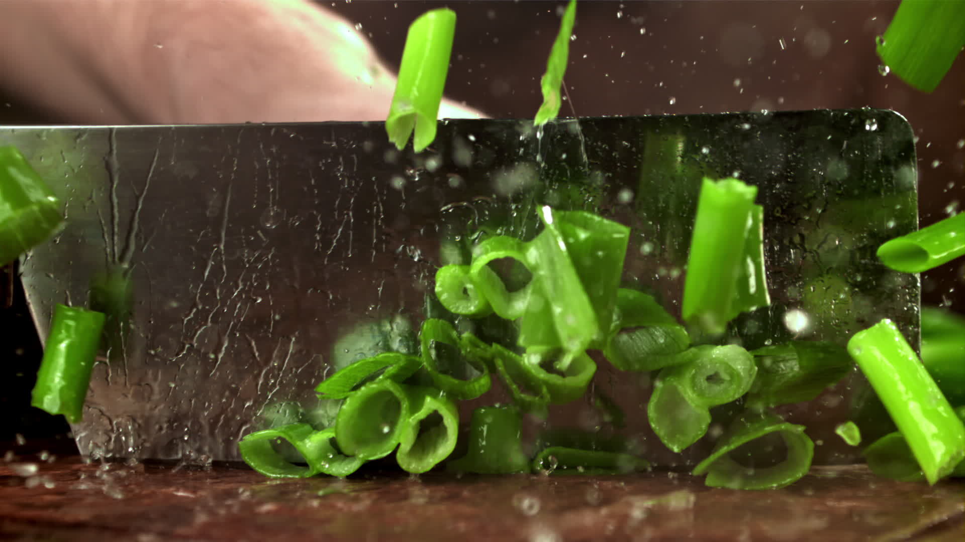 A Cook Chops Green Onions Filmed On A High Speed Camera At 1000 Fps