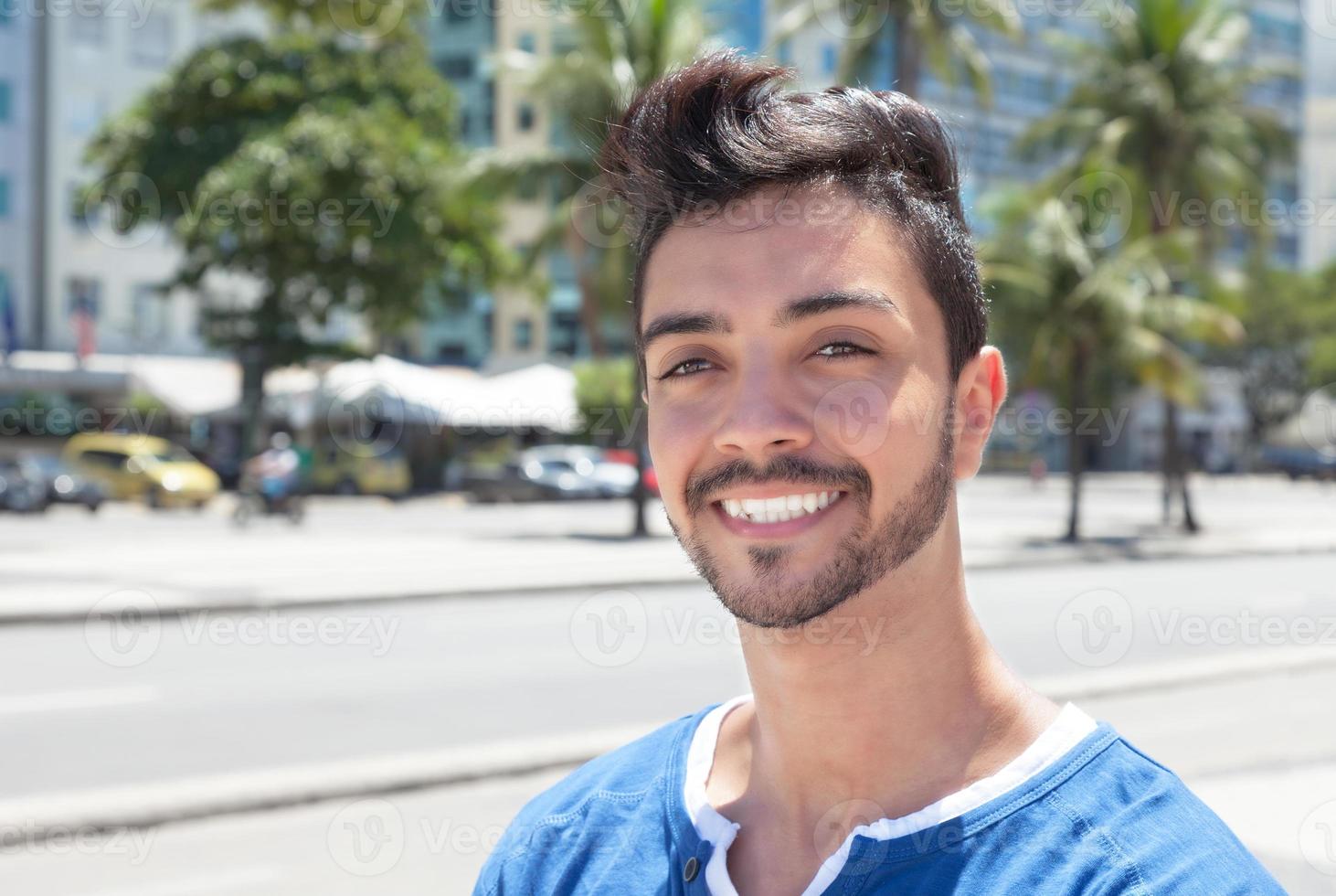 Dreaming brazilian guy in a modern city 816859 Stock Photo at Vecteezy