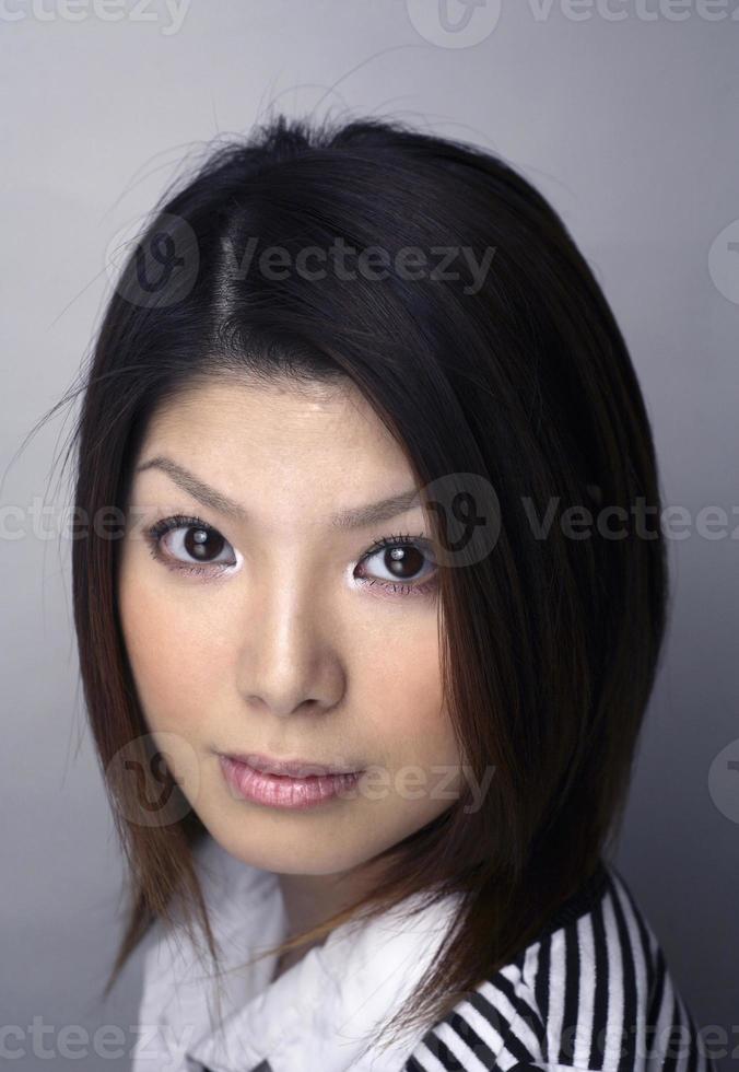 Asian woman headshot 887822 Stock Photo at Vecteezy