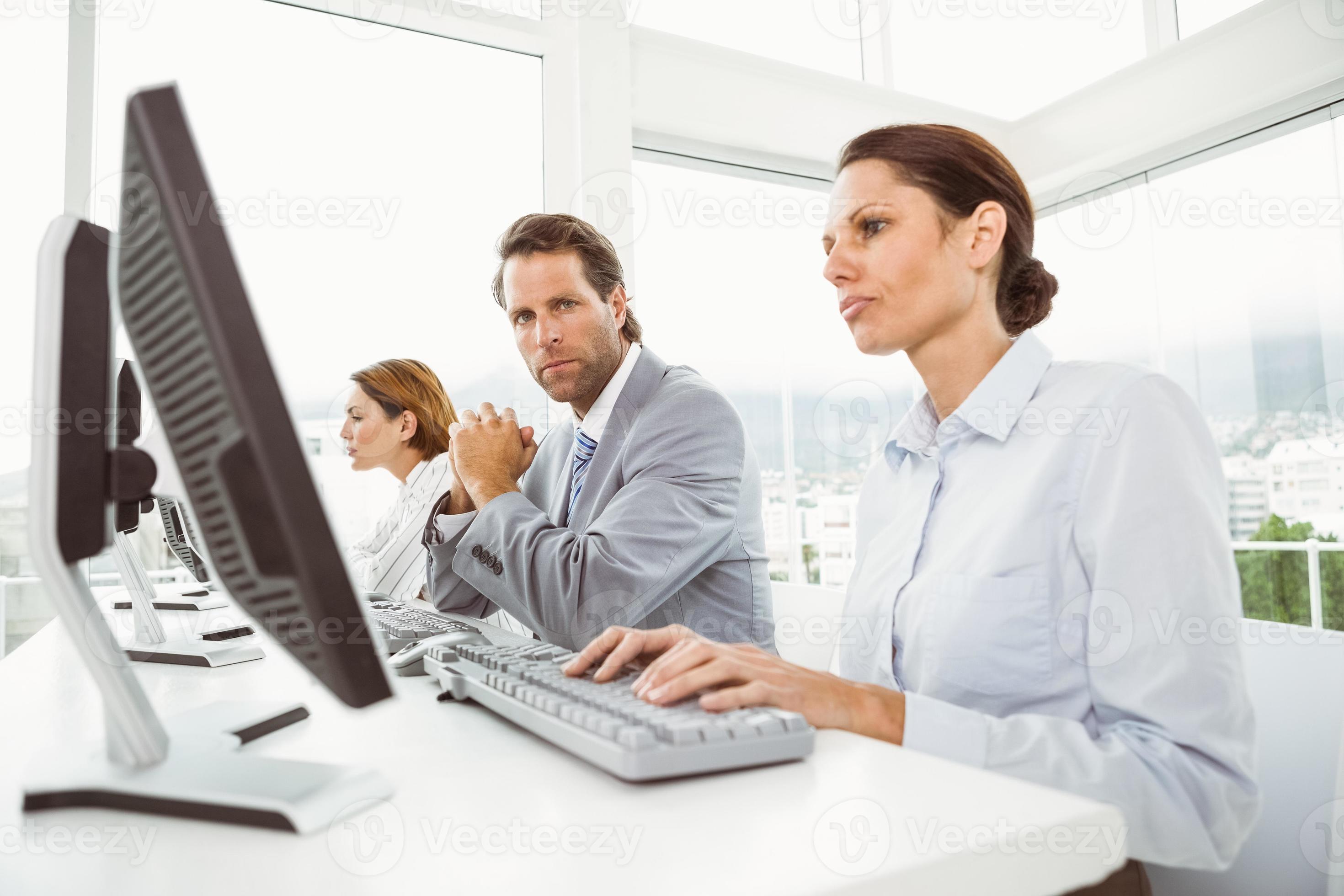 Business people using computers in office 905667 Stock Photo at Vecteezy Business people using computers in office 905667 Stock Photo at Vecteezy