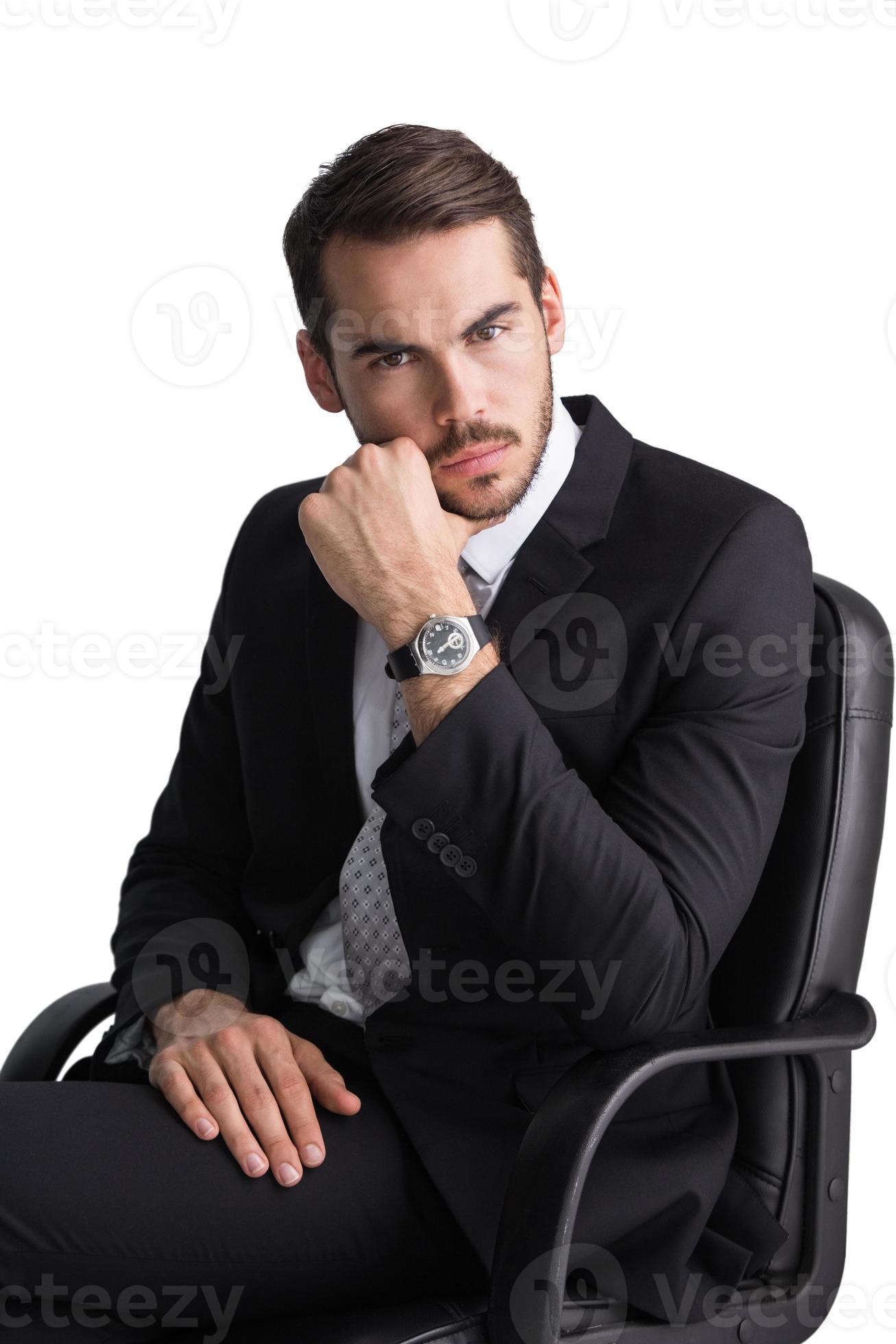 Serious businessman sitting on office chair posing 992988 Stock Photo ... Serious businessman sitting on office chair posing 992988 Stock Photo ...