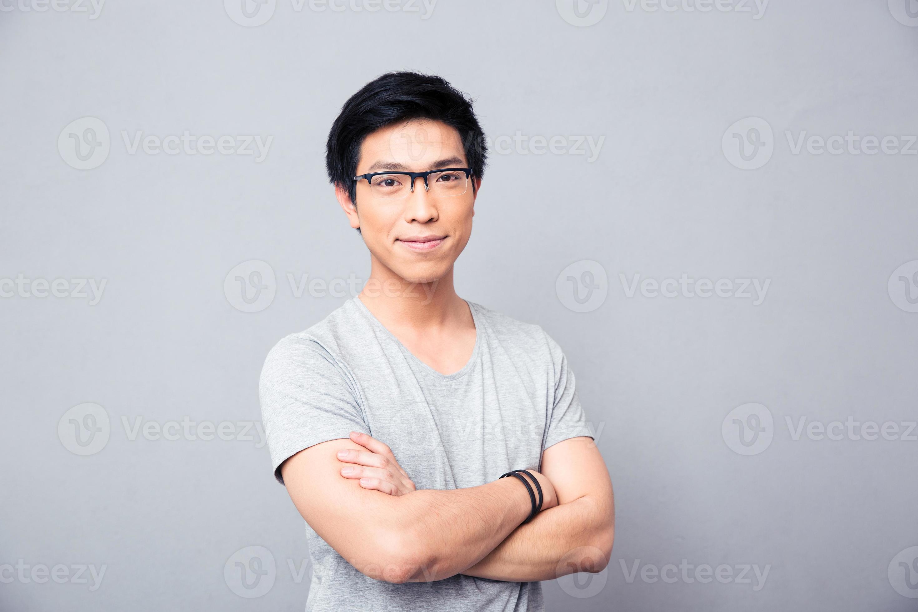 Portrait of a smiling asian man with hands crossed 1217702 Stock Photo ... Portrait of a smiling asian man with hands crossed 1217702 Stock Photo ...