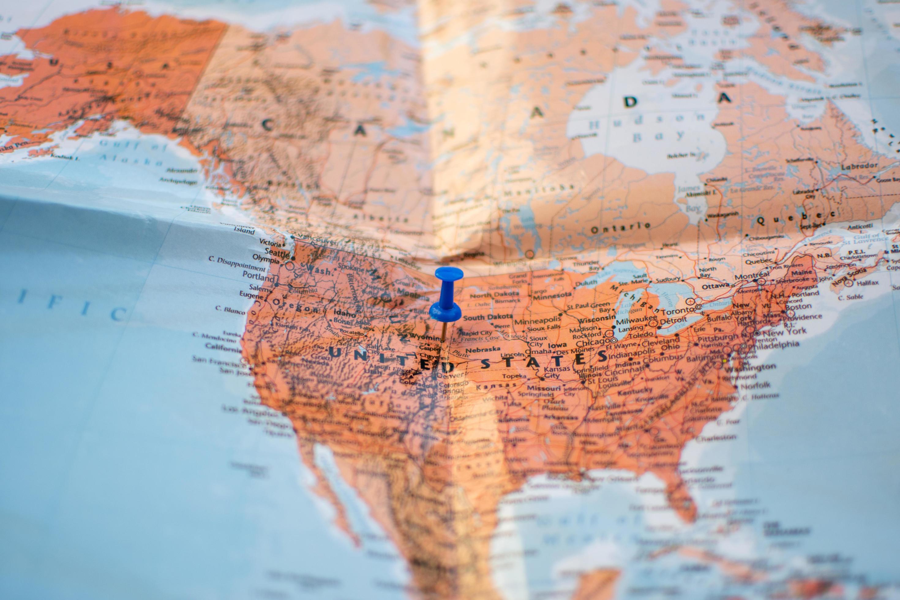 Unfolded map with pin location 1223798 Stock Photo at Vecteezy