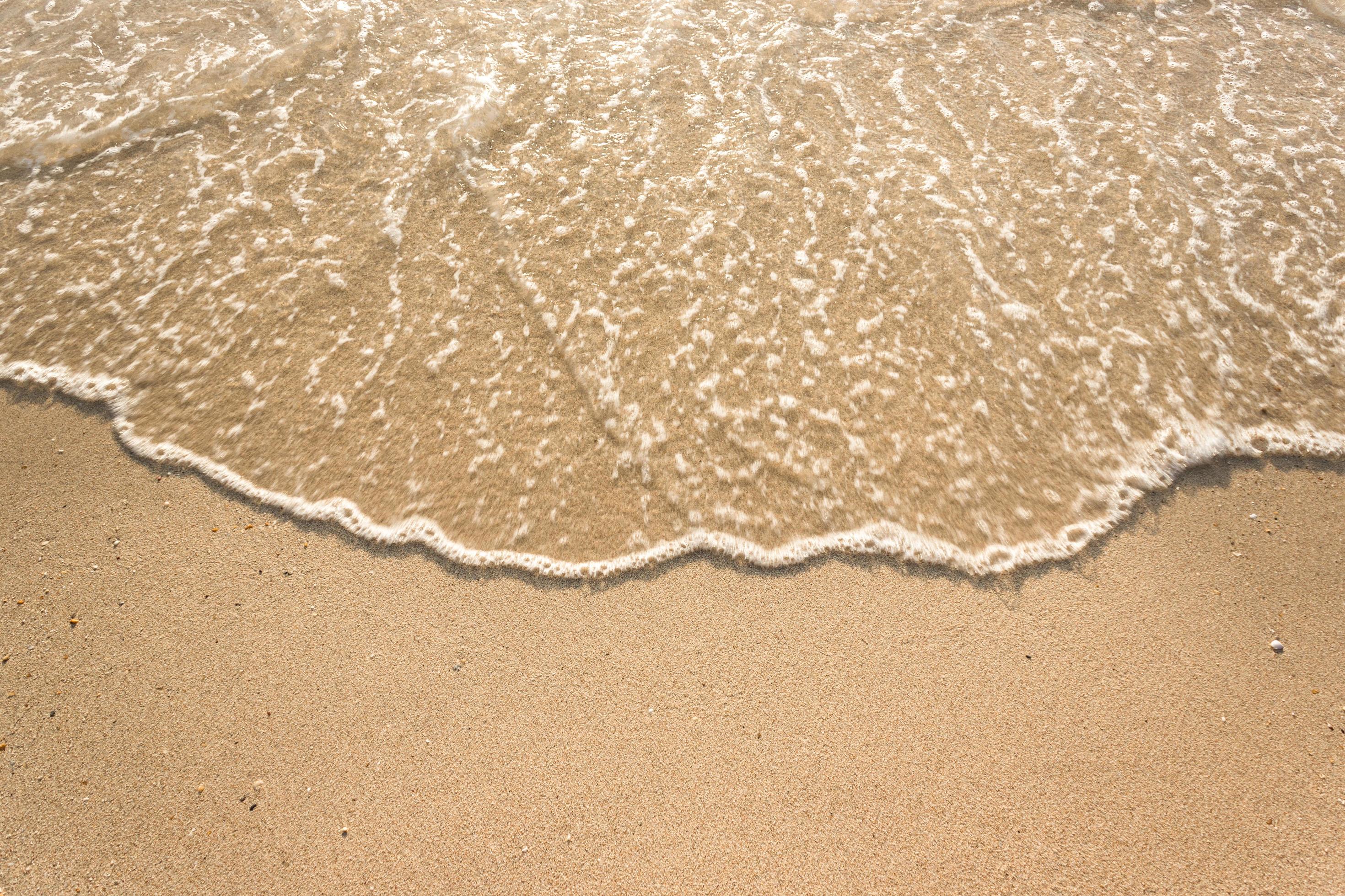 Ocean waves on sandy beach 1917721 Stock Photo at Vecteezy