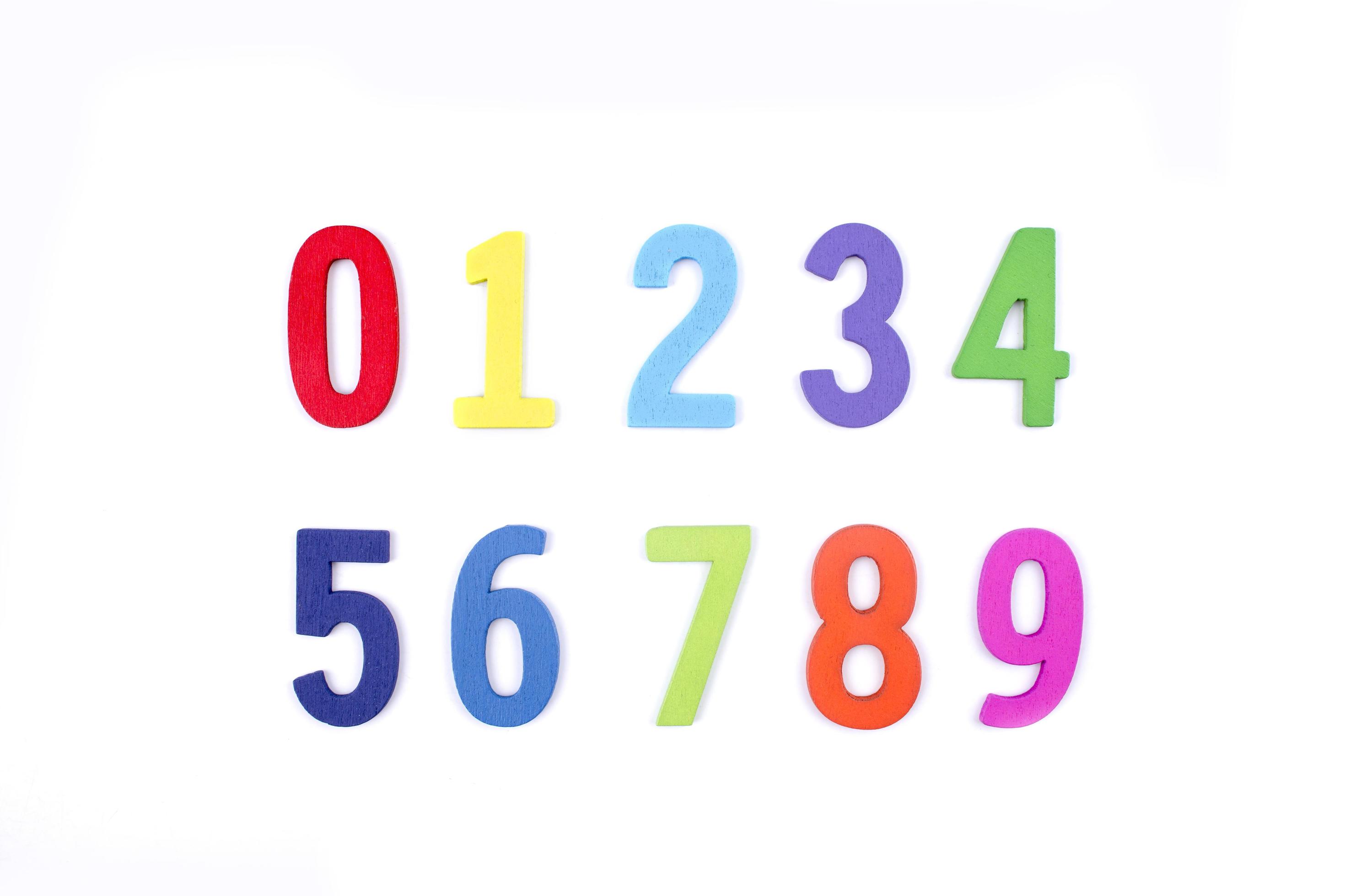 Colorful wooden numbers on white background 1920298 Stock Photo at Vecteezy