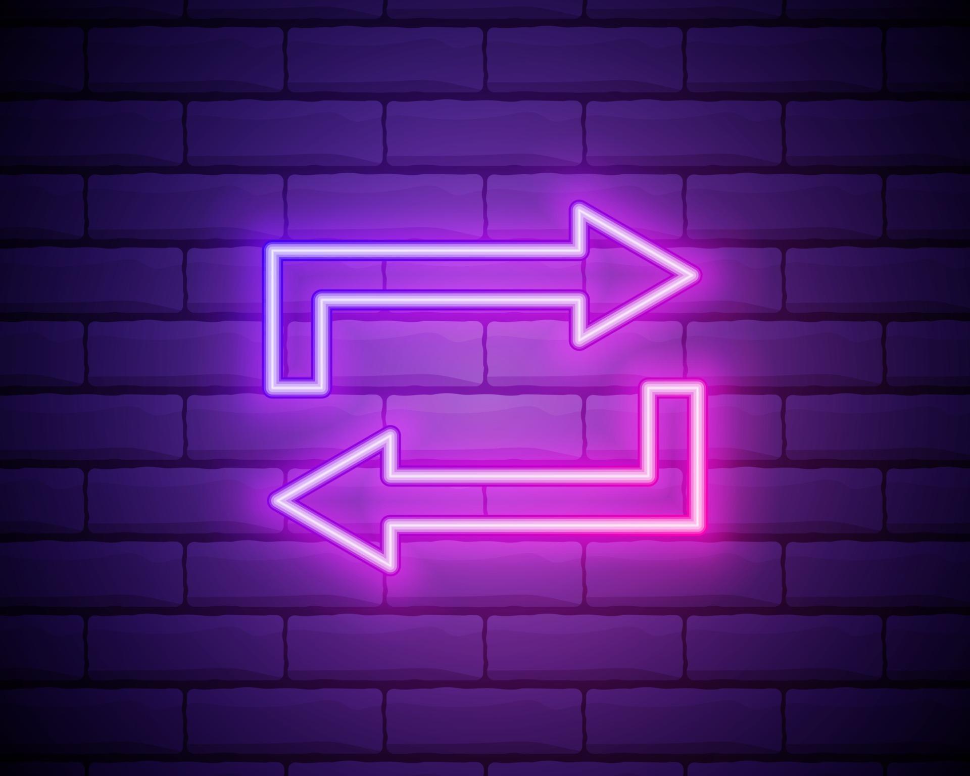 Glowing Neon Line Refresh Icon Isolated On Brick Wall Background