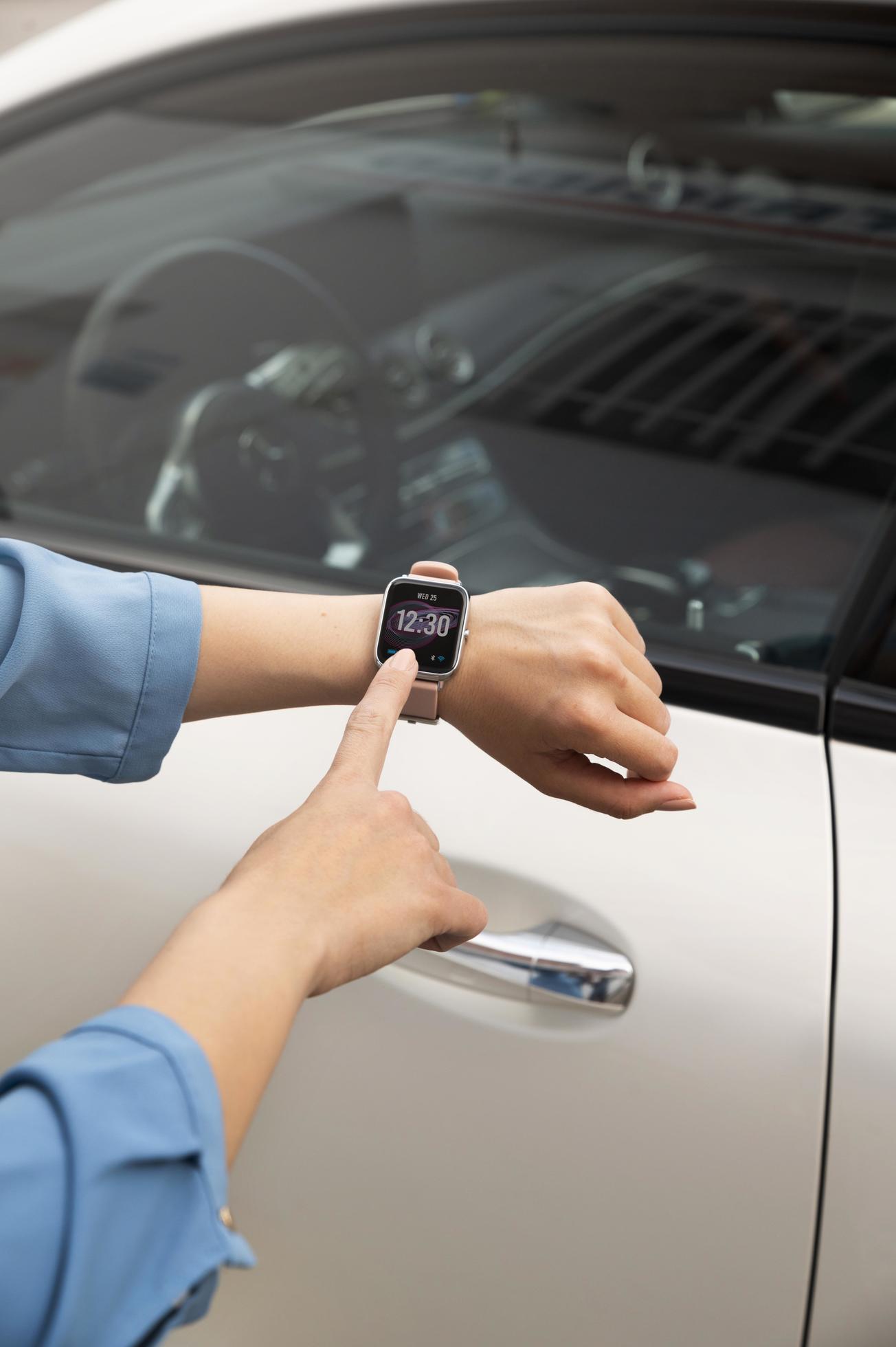 Close up hand using smartwatch to lock car Photo 2752055 Stock Photo at ...