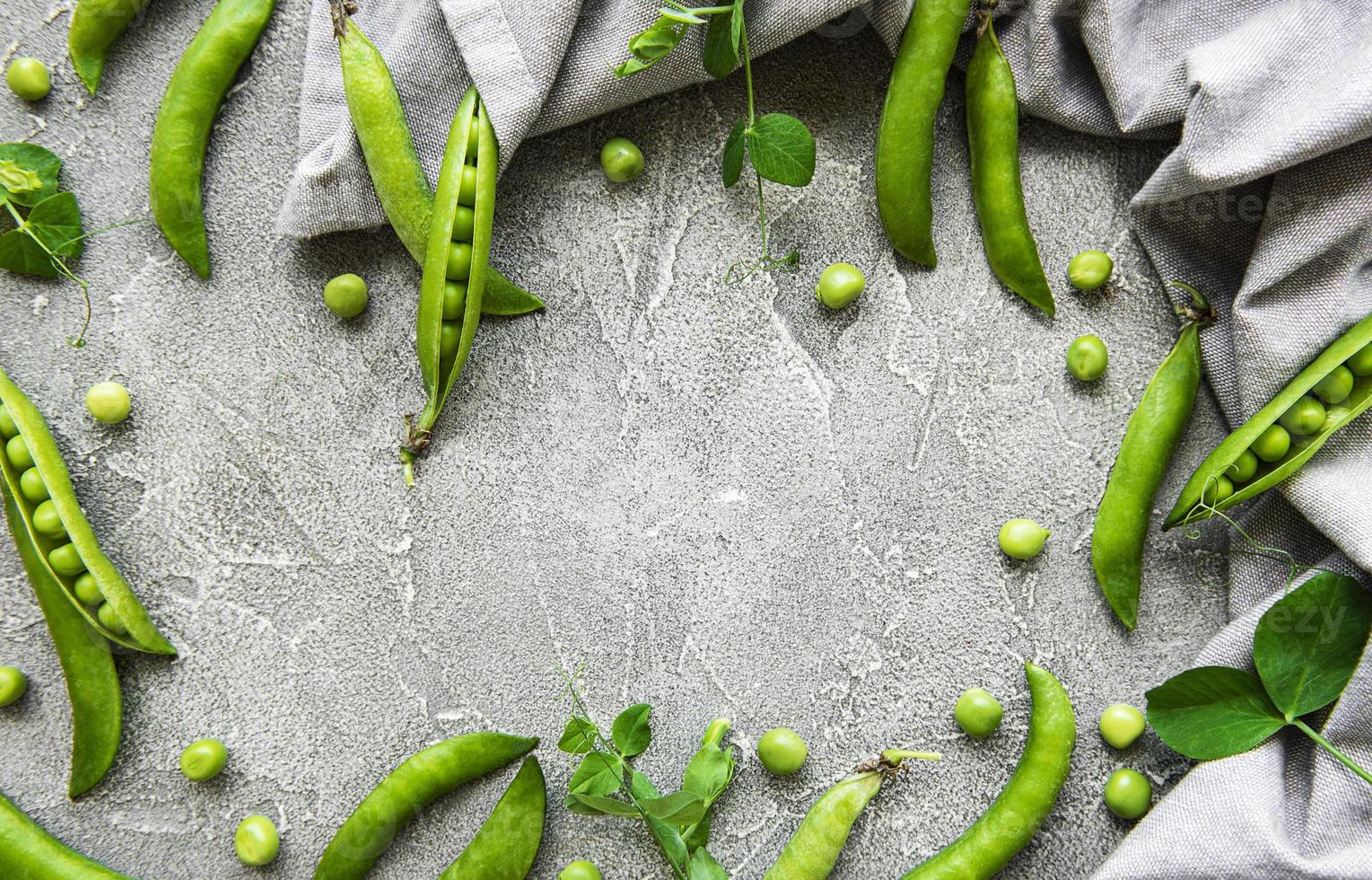 Pods of green peas on a concrete background. Organic food. 2998789 ...