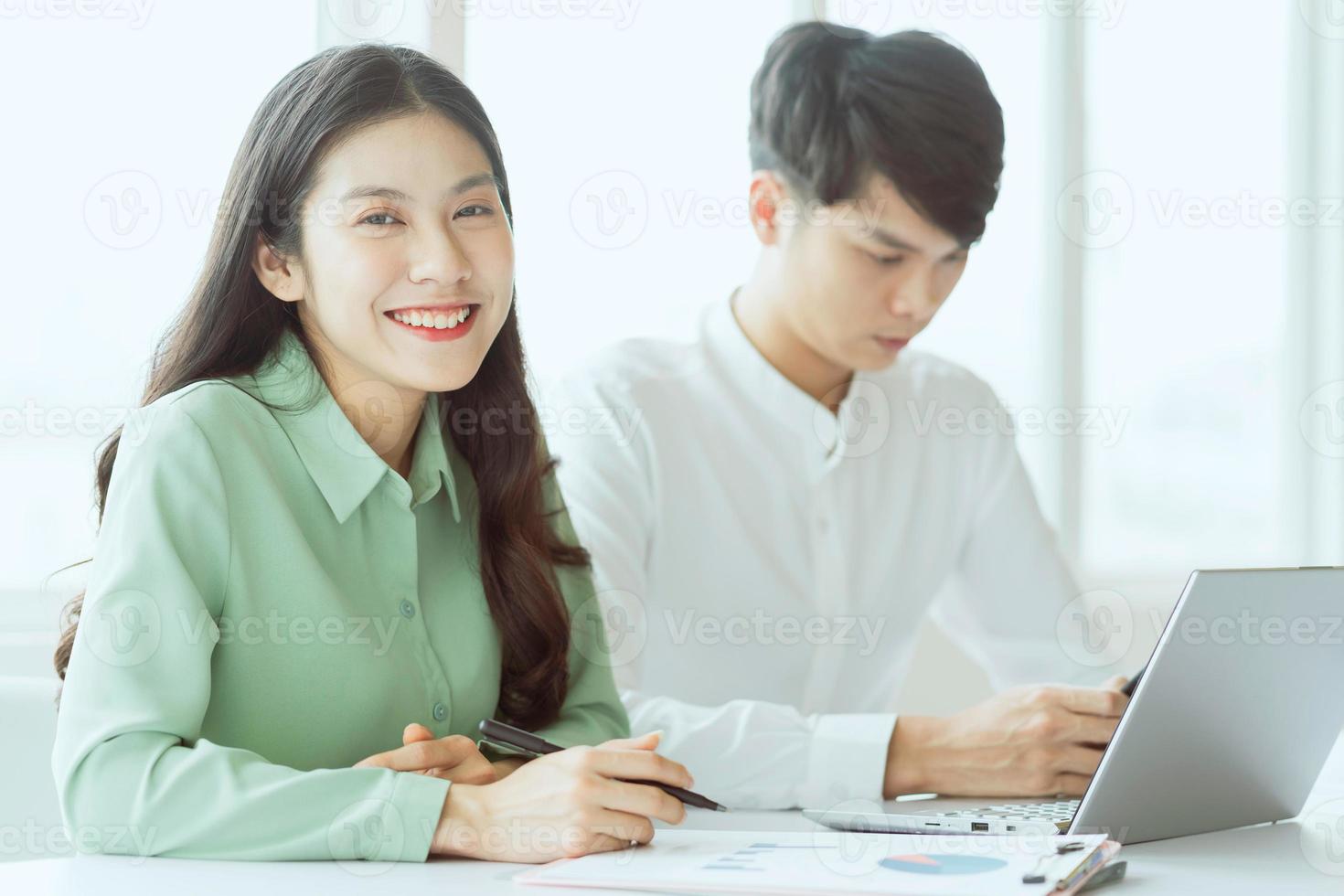 Young Asian business couple working together 3046534 Stock Photo at ... Young Asian business couple working together 3046534 Stock Photo at ...
