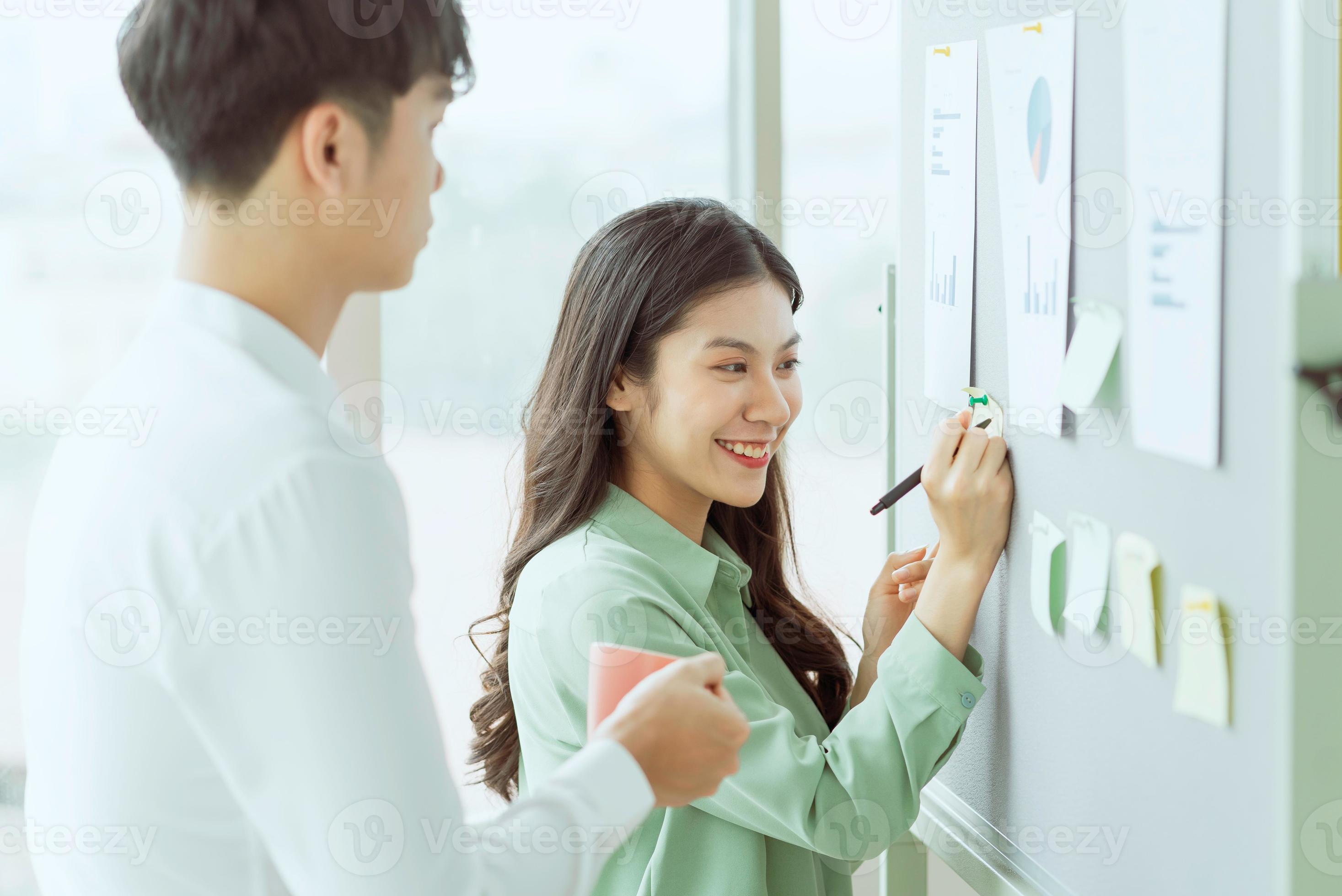 Young Asian business couple working together 3046545 Stock Photo at ... Young Asian business couple working together 3046545 Stock Photo at ...