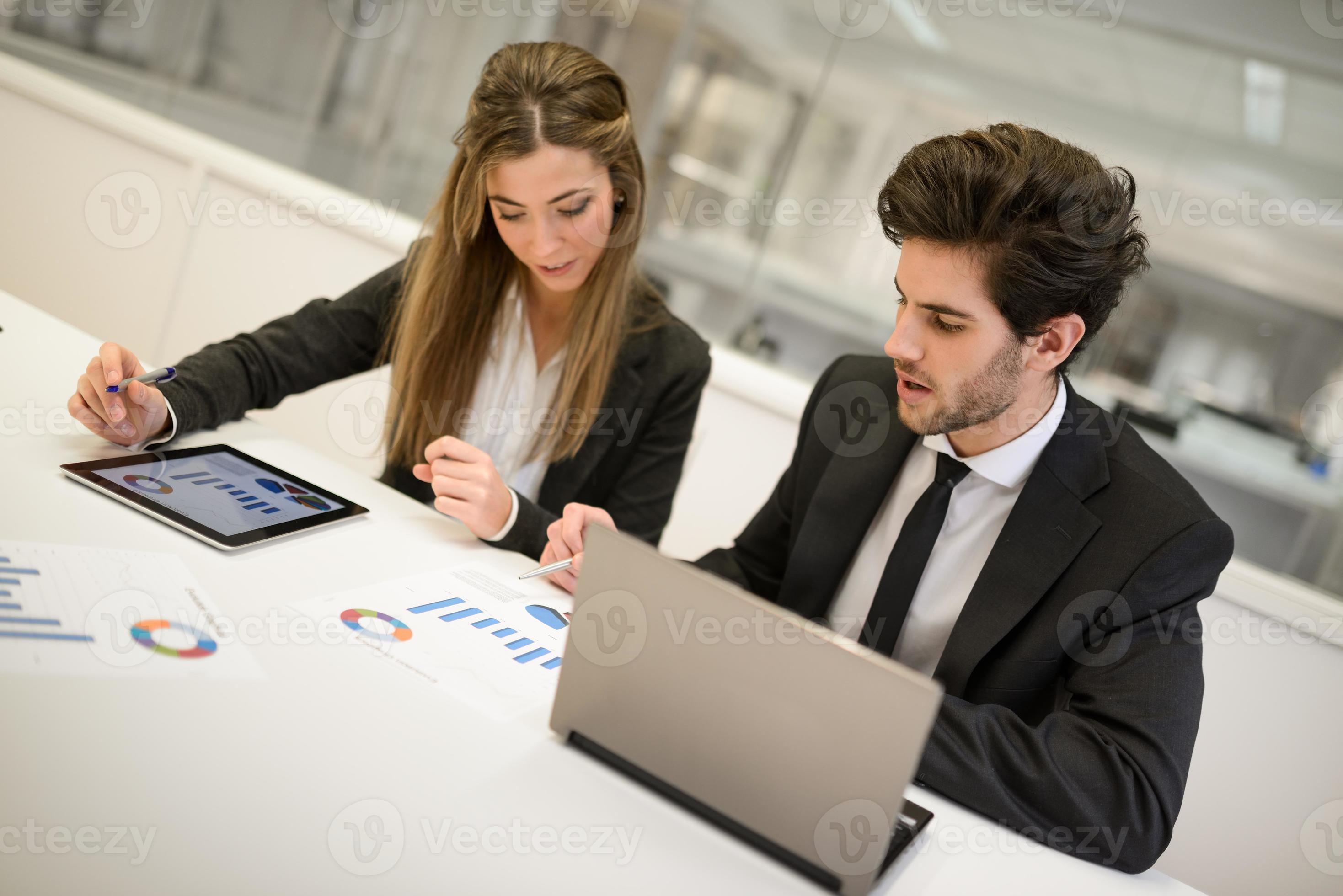 Business people working around table in modern office 4241622 Stock ... Business people working around table in modern office 4241622 Stock ...