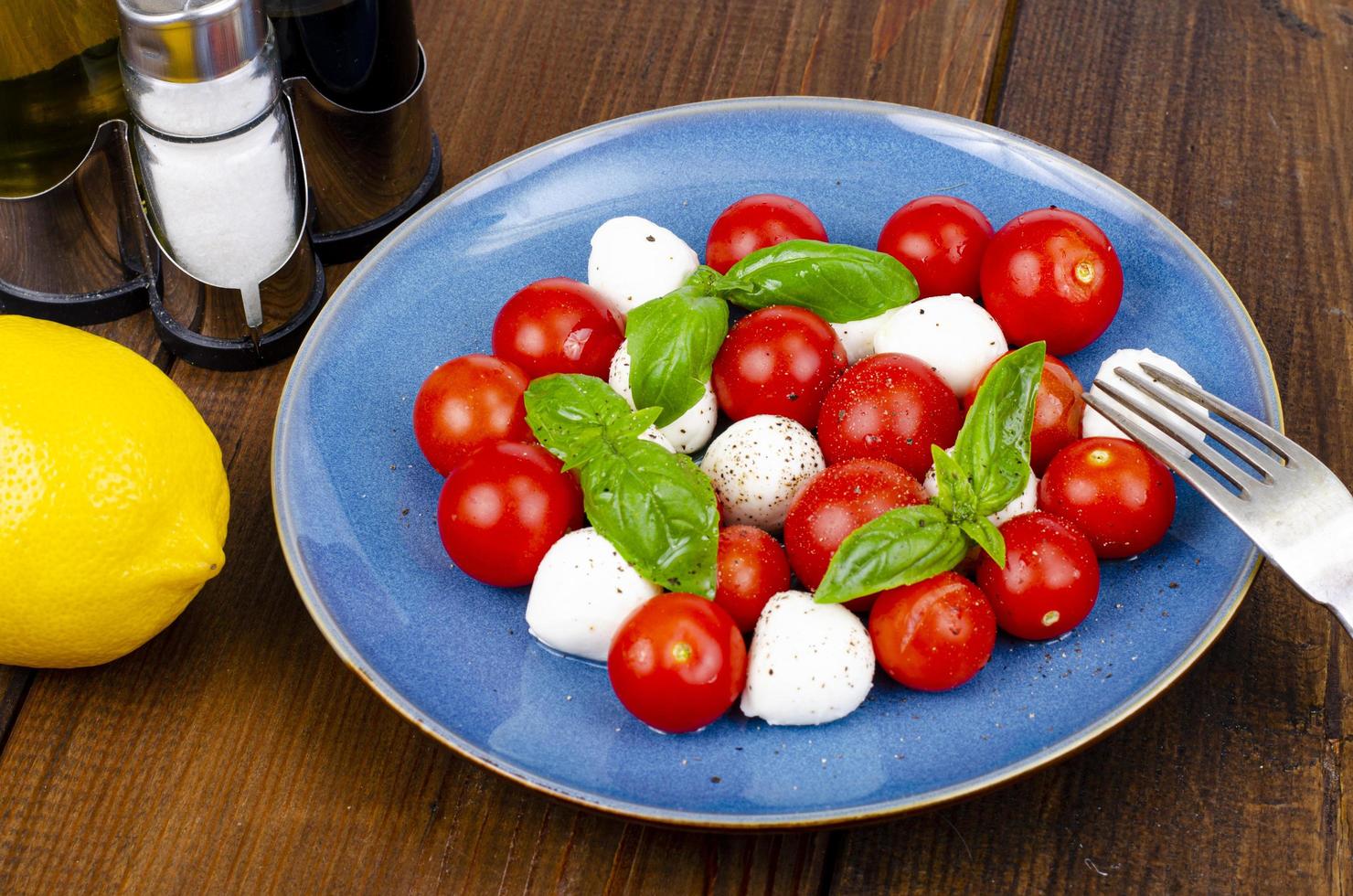 Delicious Italian Caprese Salad With Basil Mozzarella And Cherry