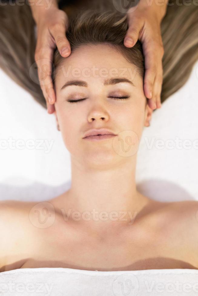 Young Blond Woman Receiving A Head Massage In A Spa Center 4675033
