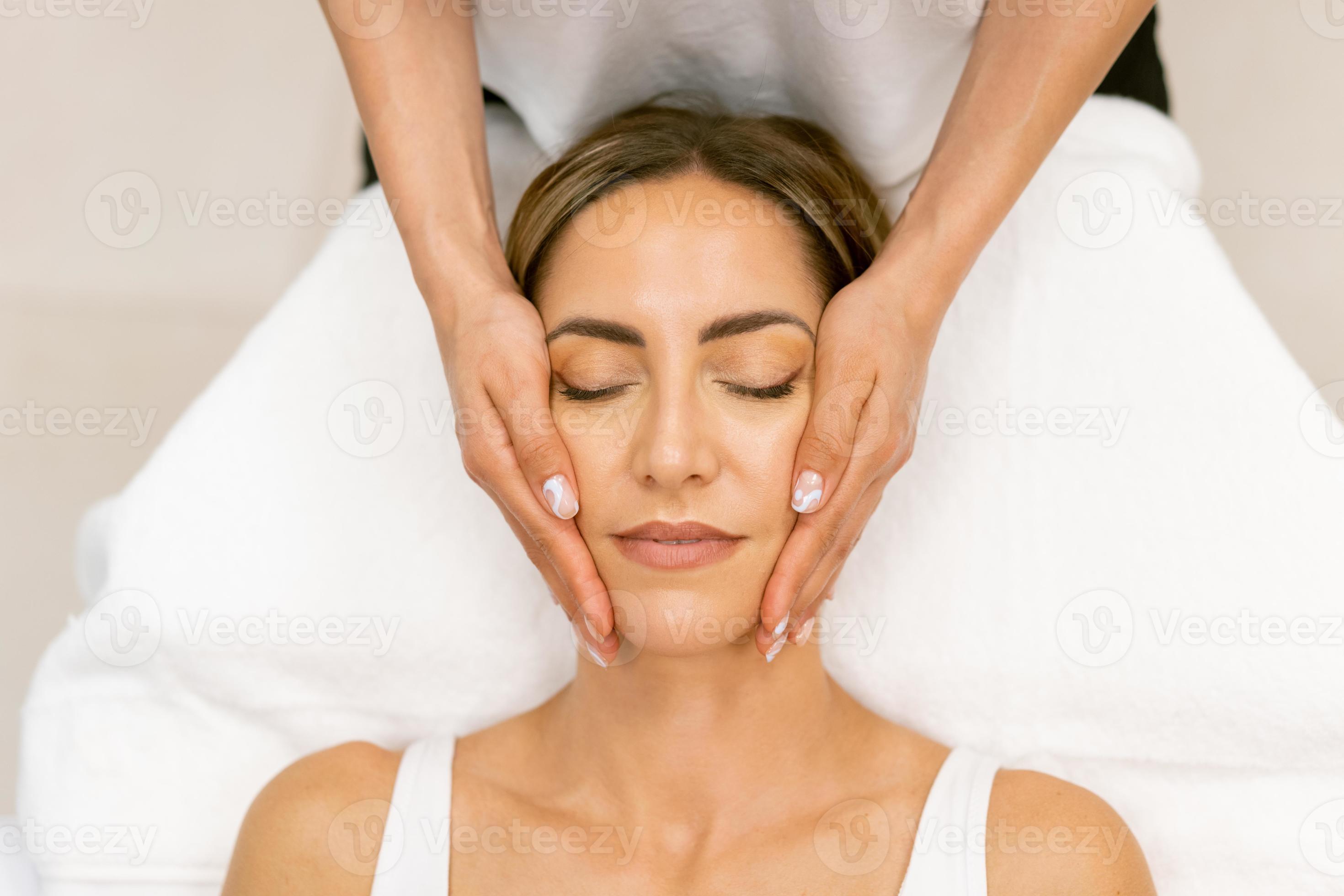 Middle Aged Woman Having A Head Massage In A Beauty Salon 4676200