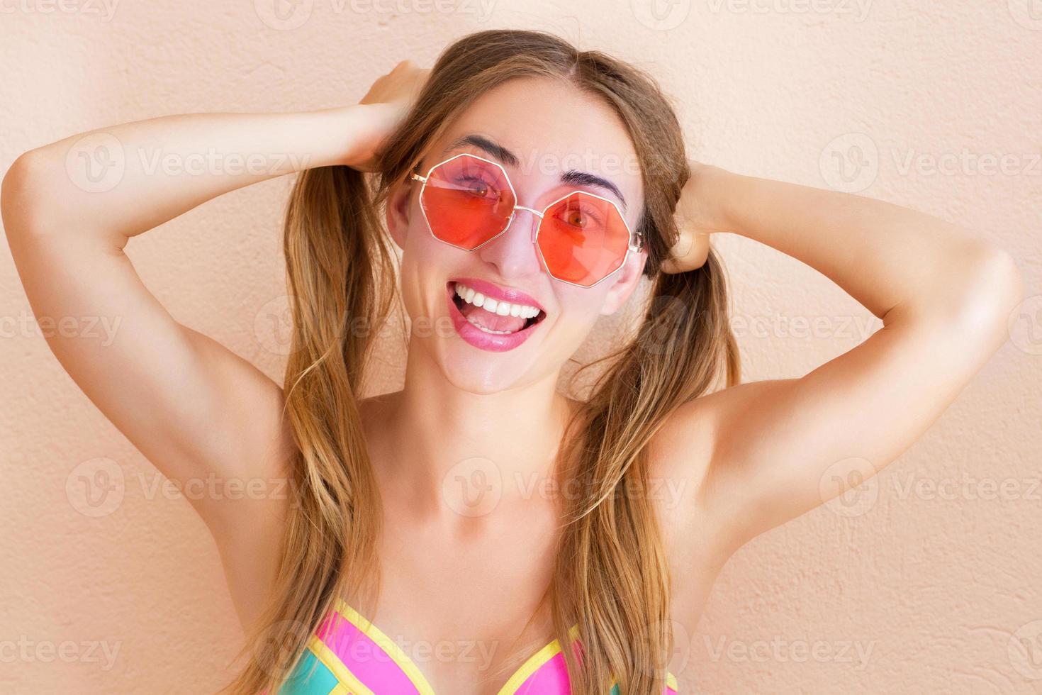Fashion Portrait Pretty Woman In Summer Red Sunglasses Over Colorful