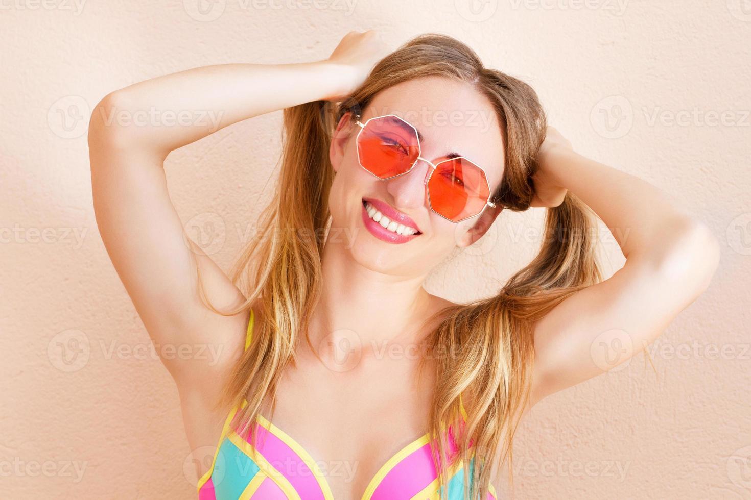 Fashion Portrait Pretty Woman In Summer Red Sunglasses Over Colorful