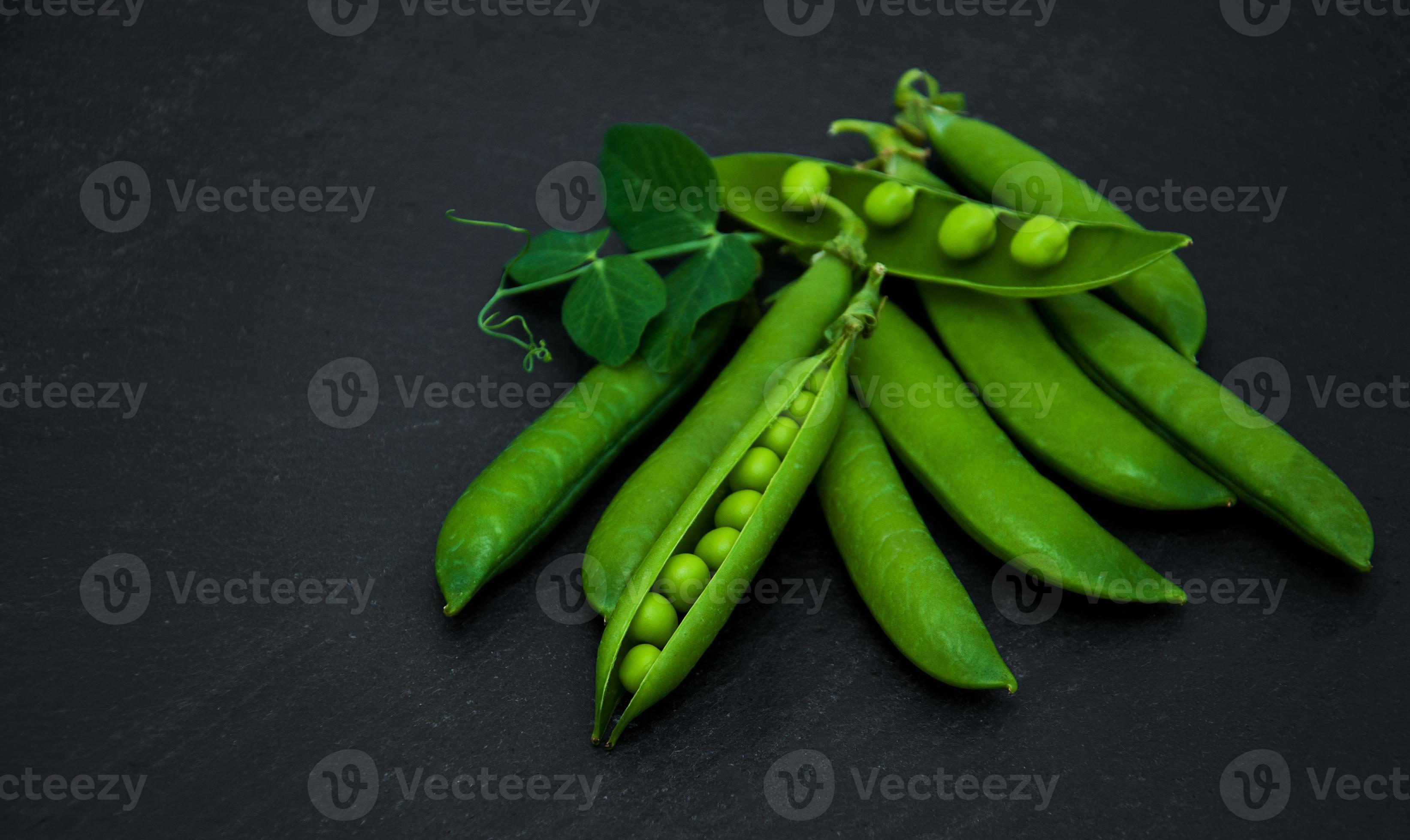 green peas on a stone background 5077070 Stock Photo at Vecteezy