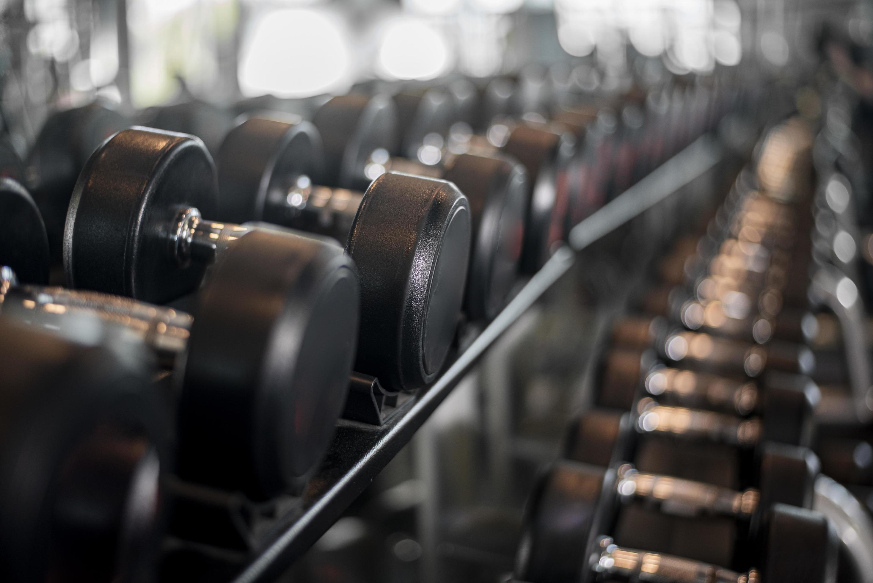 row of dumbbell in fitness gym 5084270 Stock Photo at Vecteezy