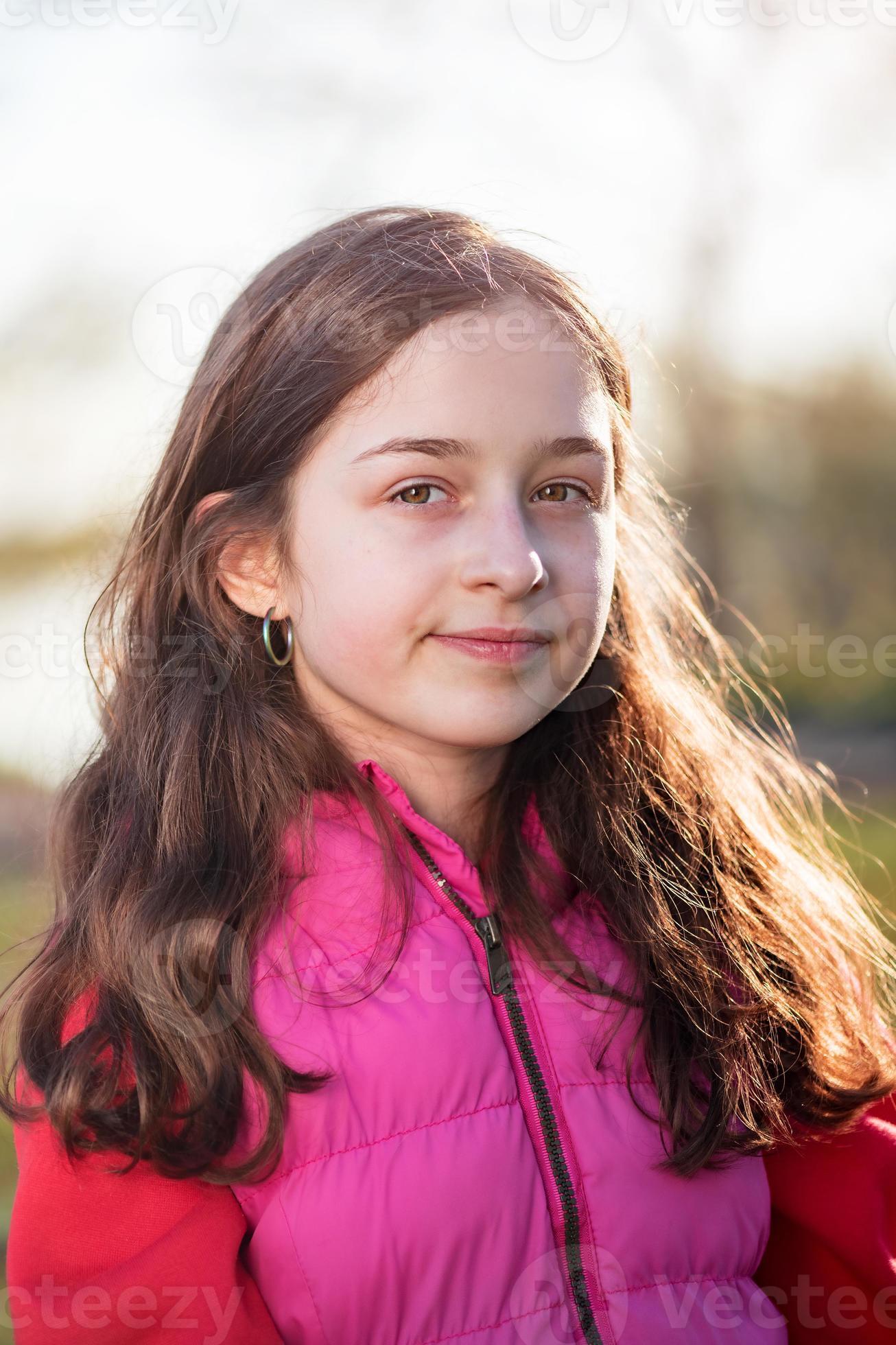 Adolescence Little Girl In Nature In A Pink Vest An 11 year old Girl adolescence-little-girl-in-nature-in-a-pink-vest-an-11-year-old-girl