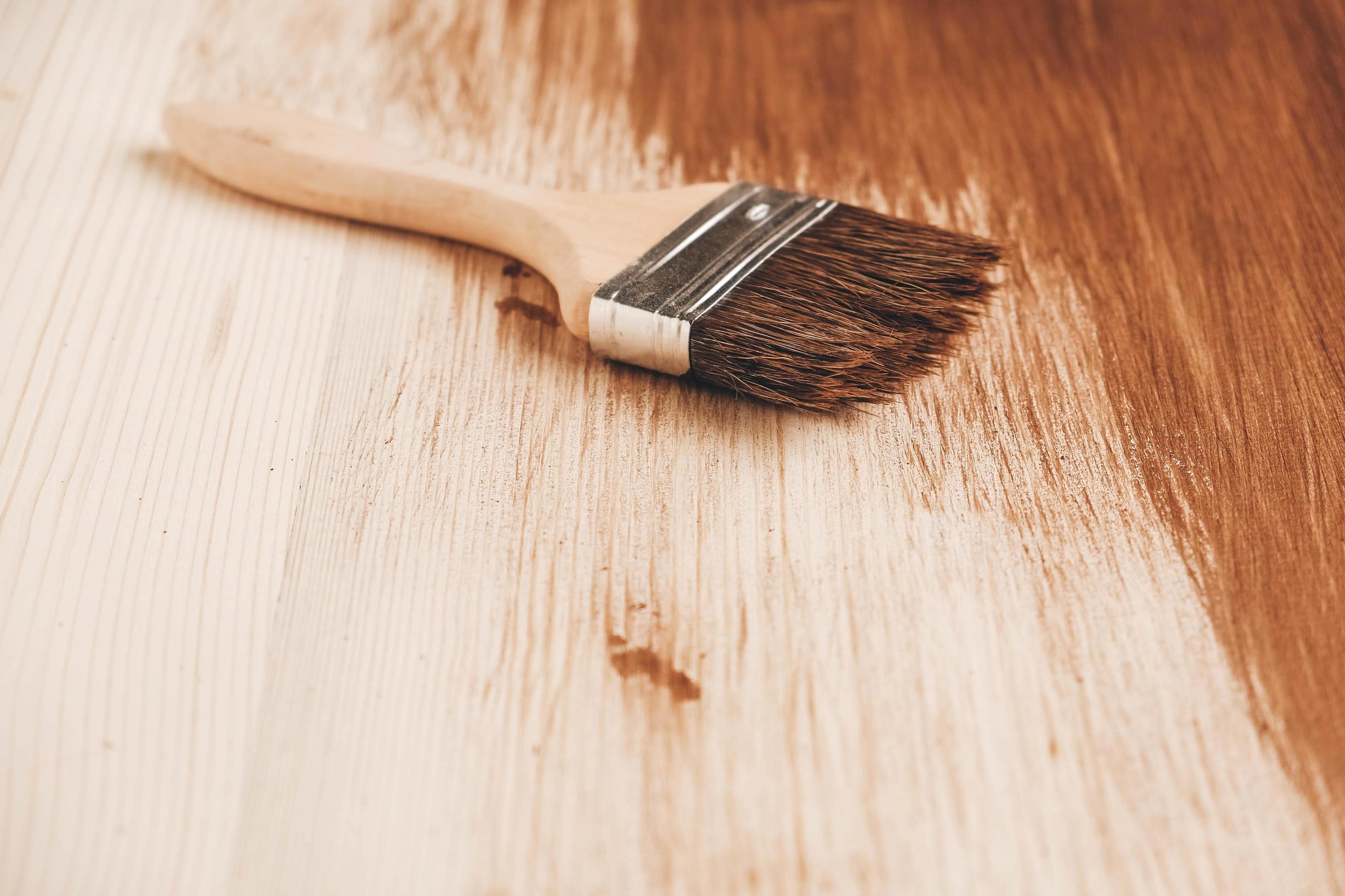 Brush with wooden handle and natural bristles against background of ...