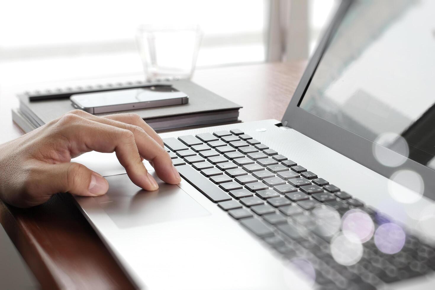 Young creative designer man working with laptop at office as concept ... Young creative designer man working with laptop at office as concept ...