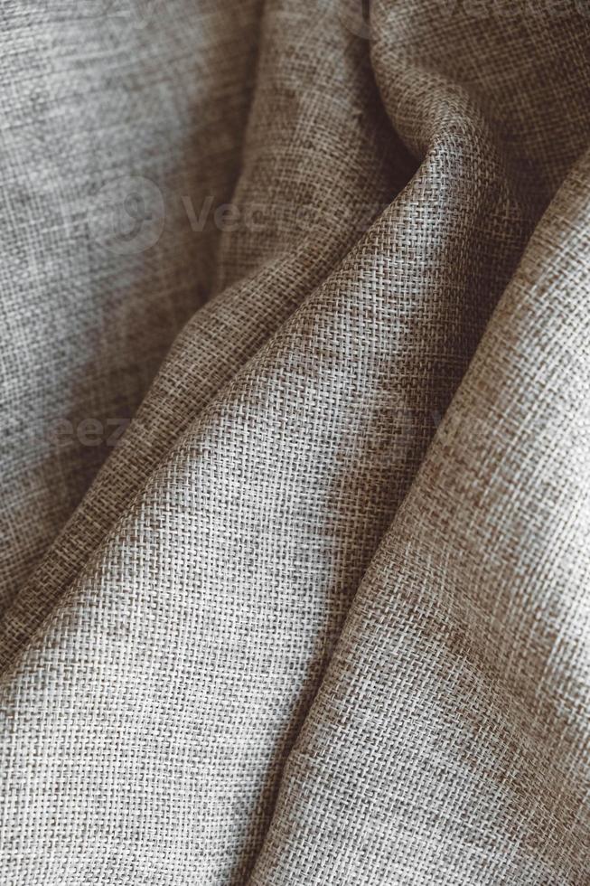 Crumpled gray linen fabric as background texture. Top view. Copy, empty ...