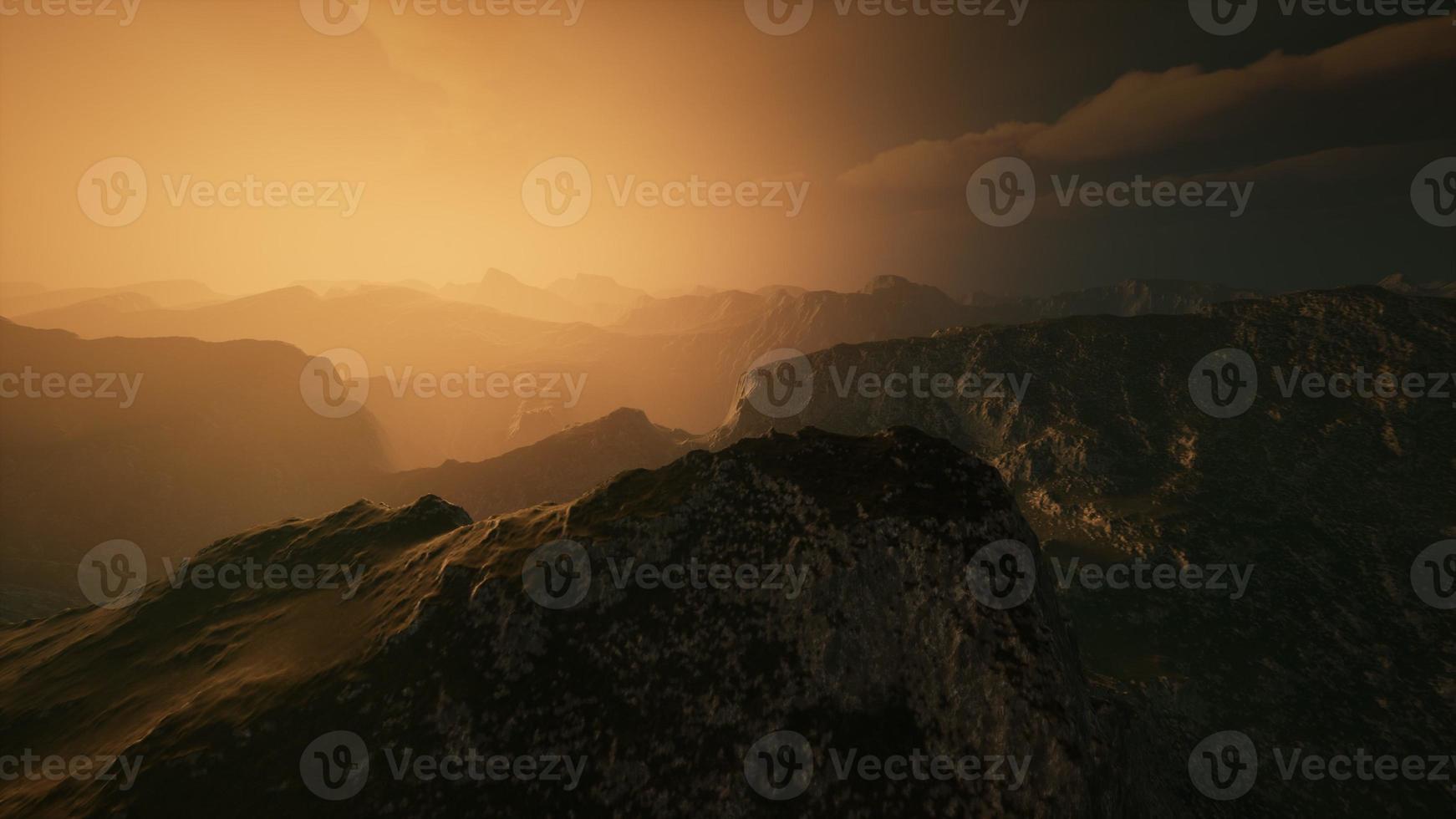 High mountain peaks covered with dramatic heavy fog 5754812 Stock Photo ...