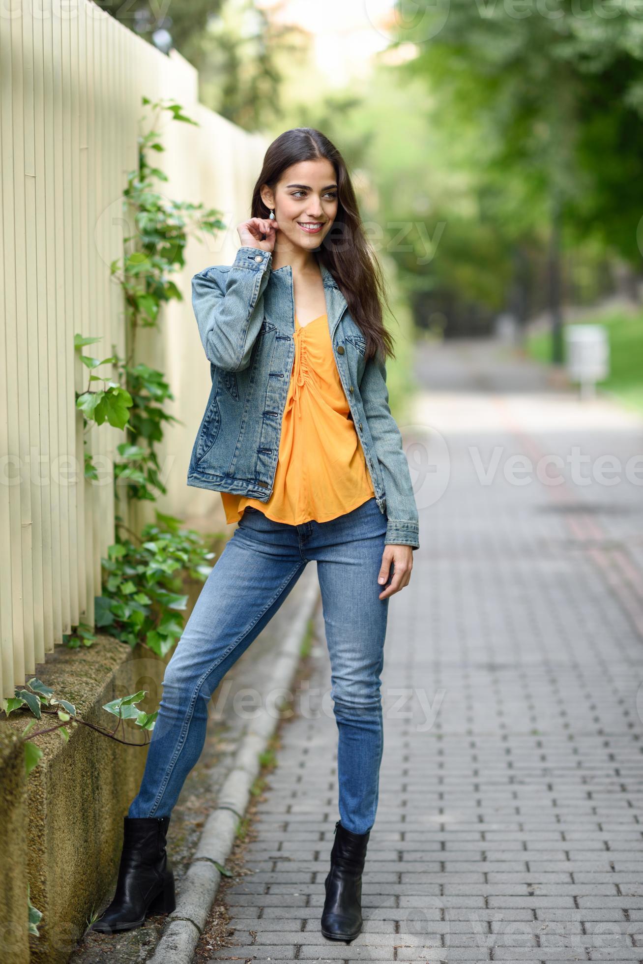 Woman With Nice Hair Wearing Casual Clothes In Urban Background