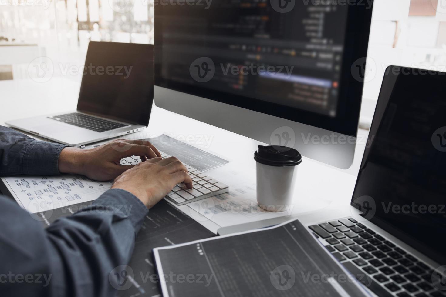 Asian man working code program developer computer web development working design software on ...