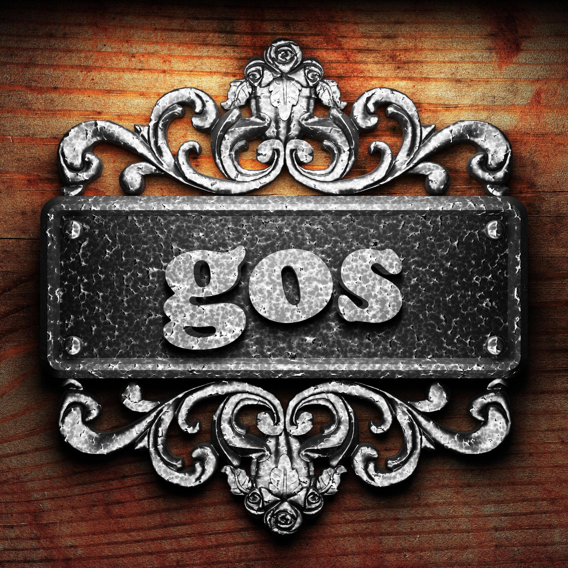 gos word of iron on wooden background 6337463 Stock Photo at Vecteezy