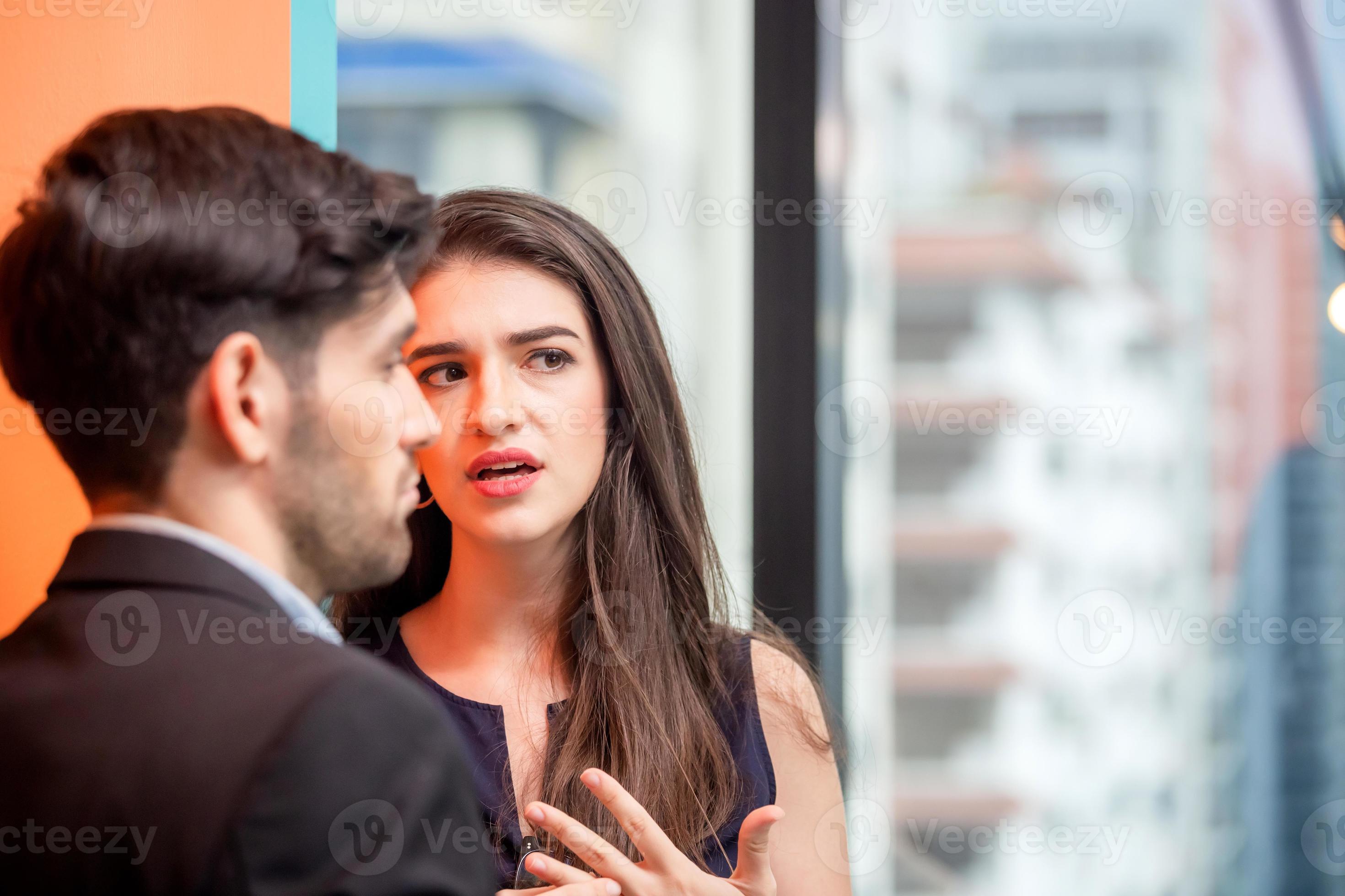 Business Woman And Businessman Talking Together Other In Office 6724222 business-woman-and-businessman-talking-together-other-in-office-6724222