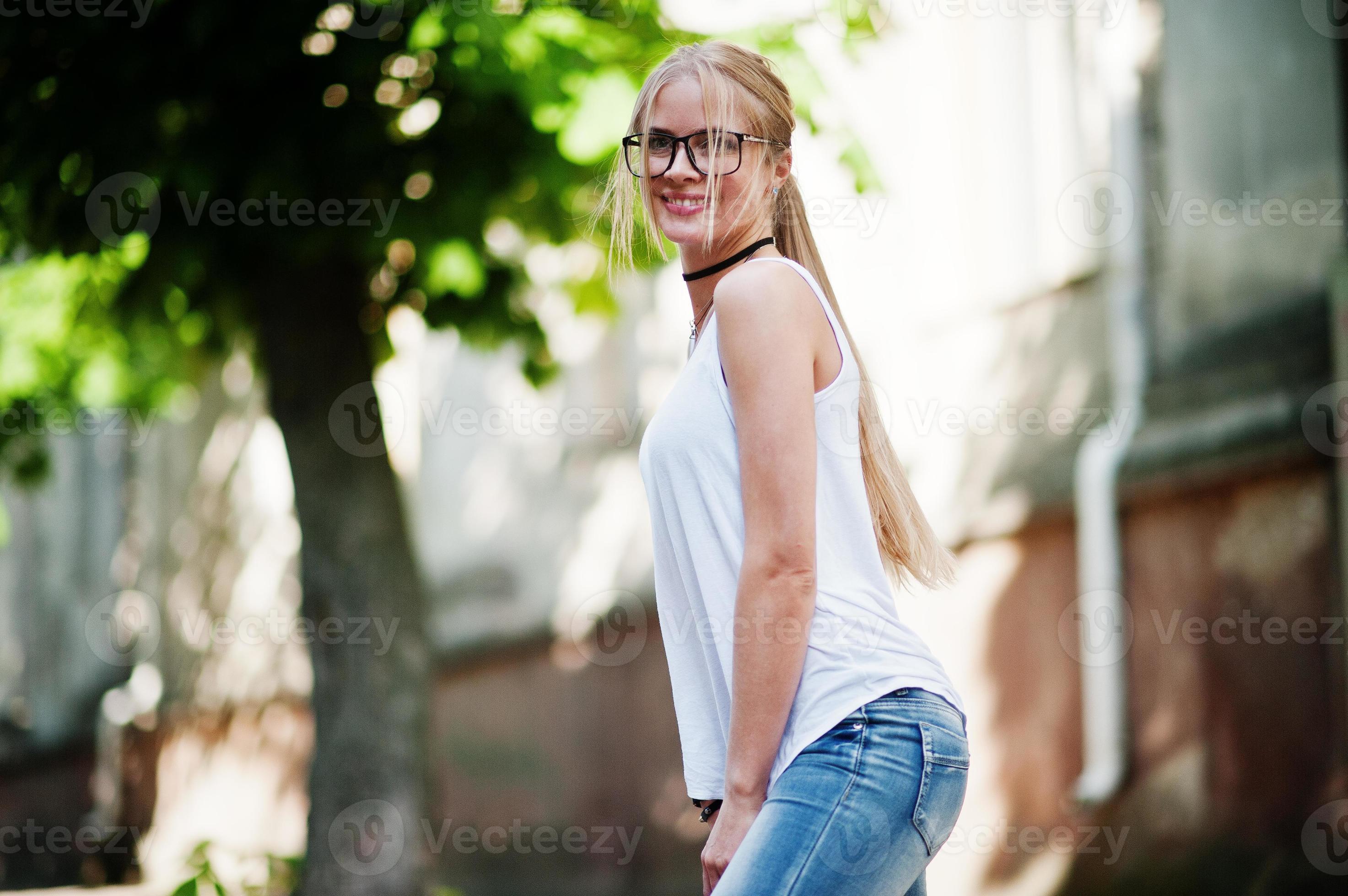 Stylish Blonde Woman Wear At Jeans Glasses Choker And White Shirt
