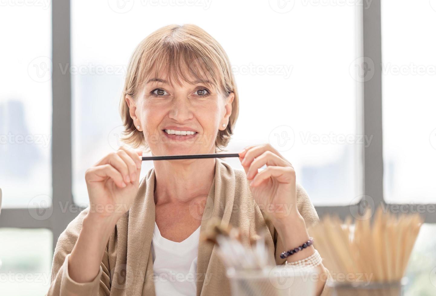 Portrait Of Happy Elder Senior Woman Looking At Camera Smiling Mature