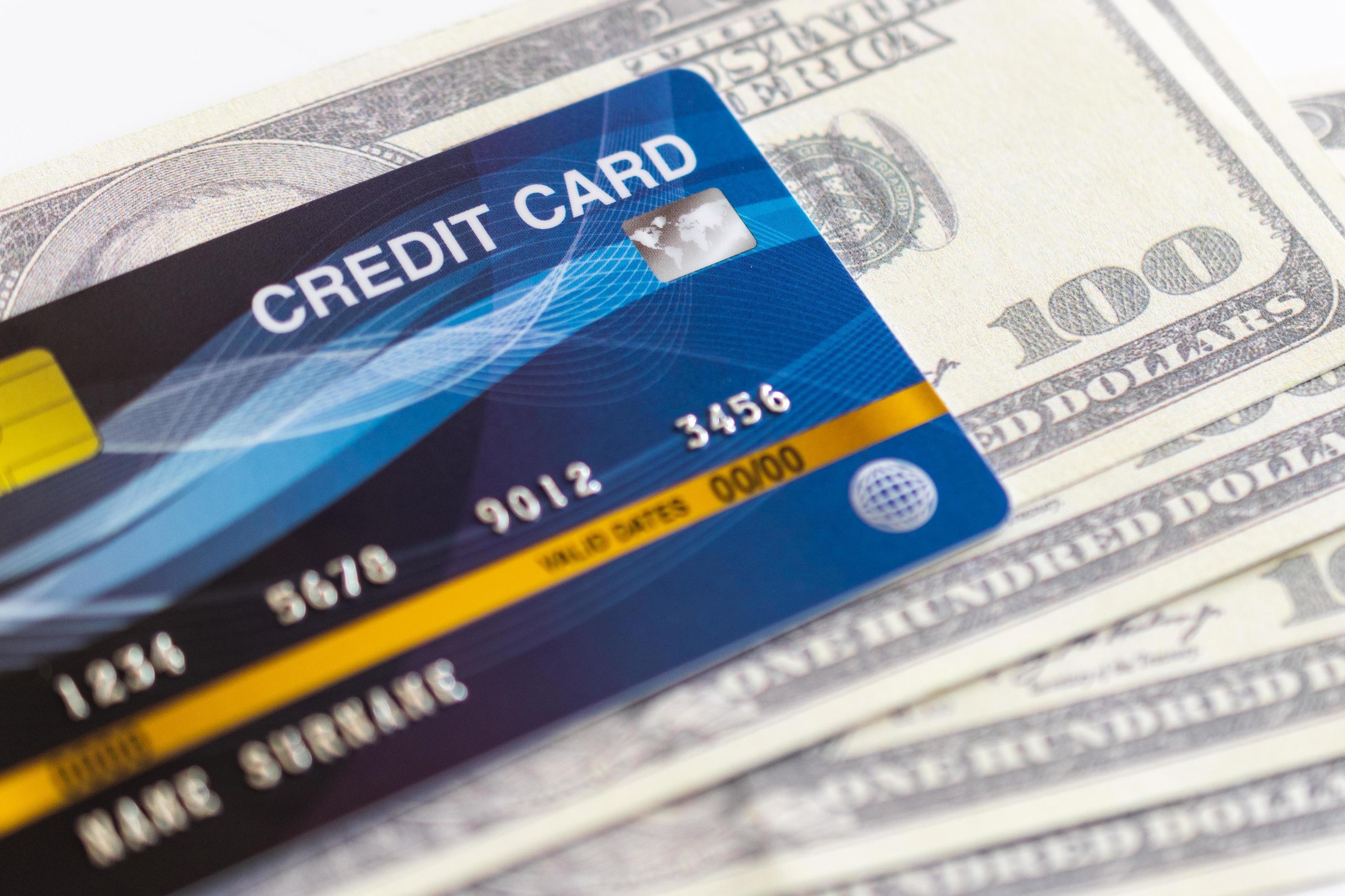 credit-cards-and-100-dollars-in-cash-7184047-stock-photo-at-vecteezy