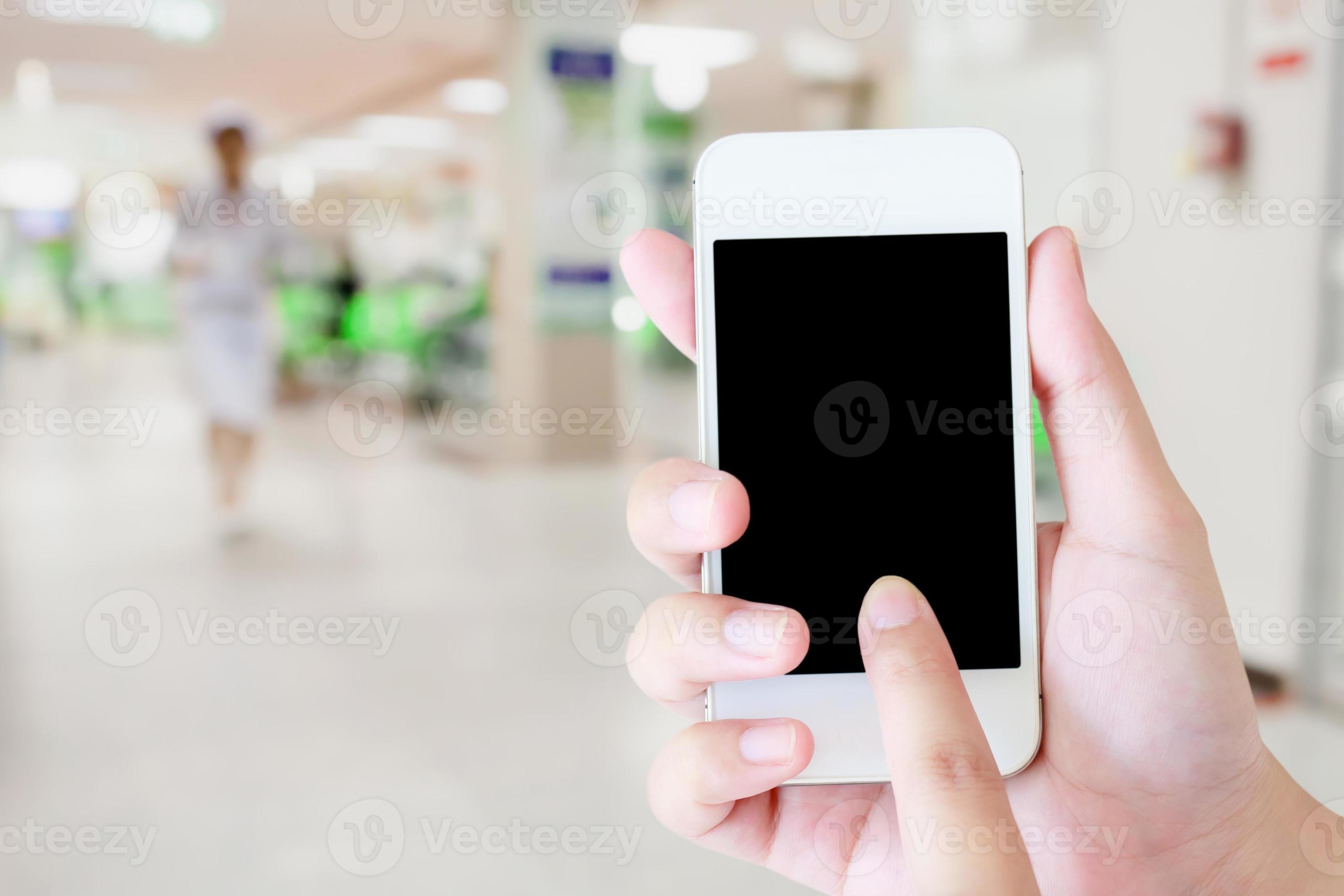 hand hold mobile smartphone with hospital interior background 7199191 ... hand hold mobile smartphone with hospital interior background 7199191 ...
