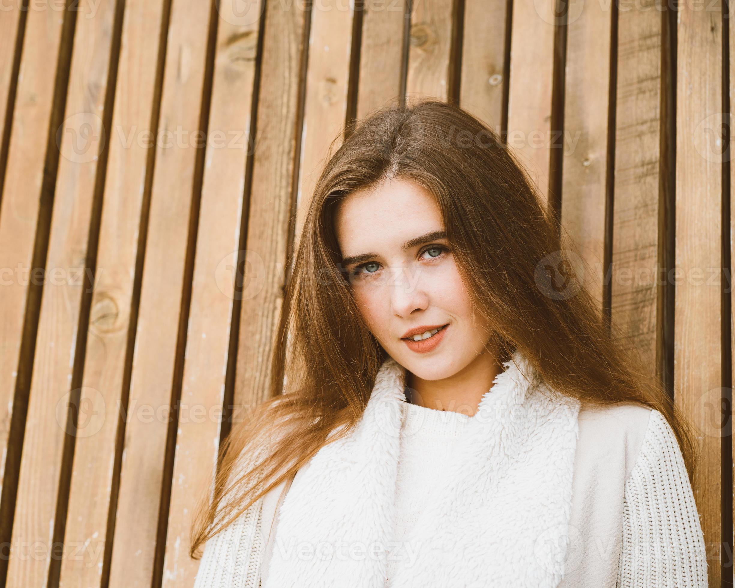 Close up portrait of beautiful young girl with long brown hair on ...