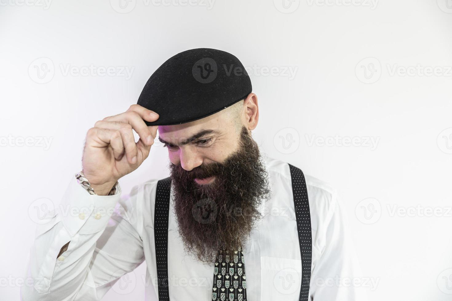 Bearded man looking down. Concept of masculinity and care with the ...