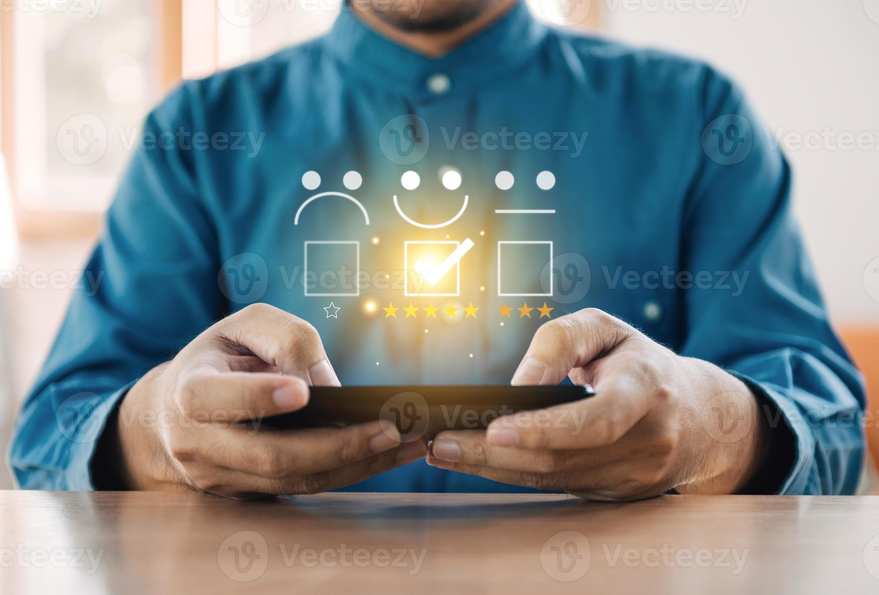 Customer service evaluation concept. Businessman using a smartphone And ...