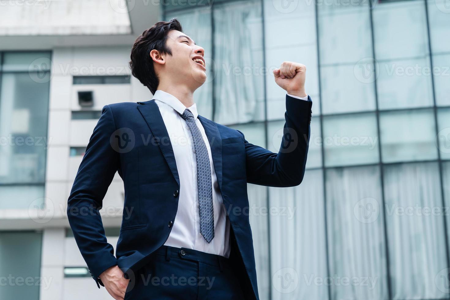 Image of Young asian businessman with glass building background 8368295 ...