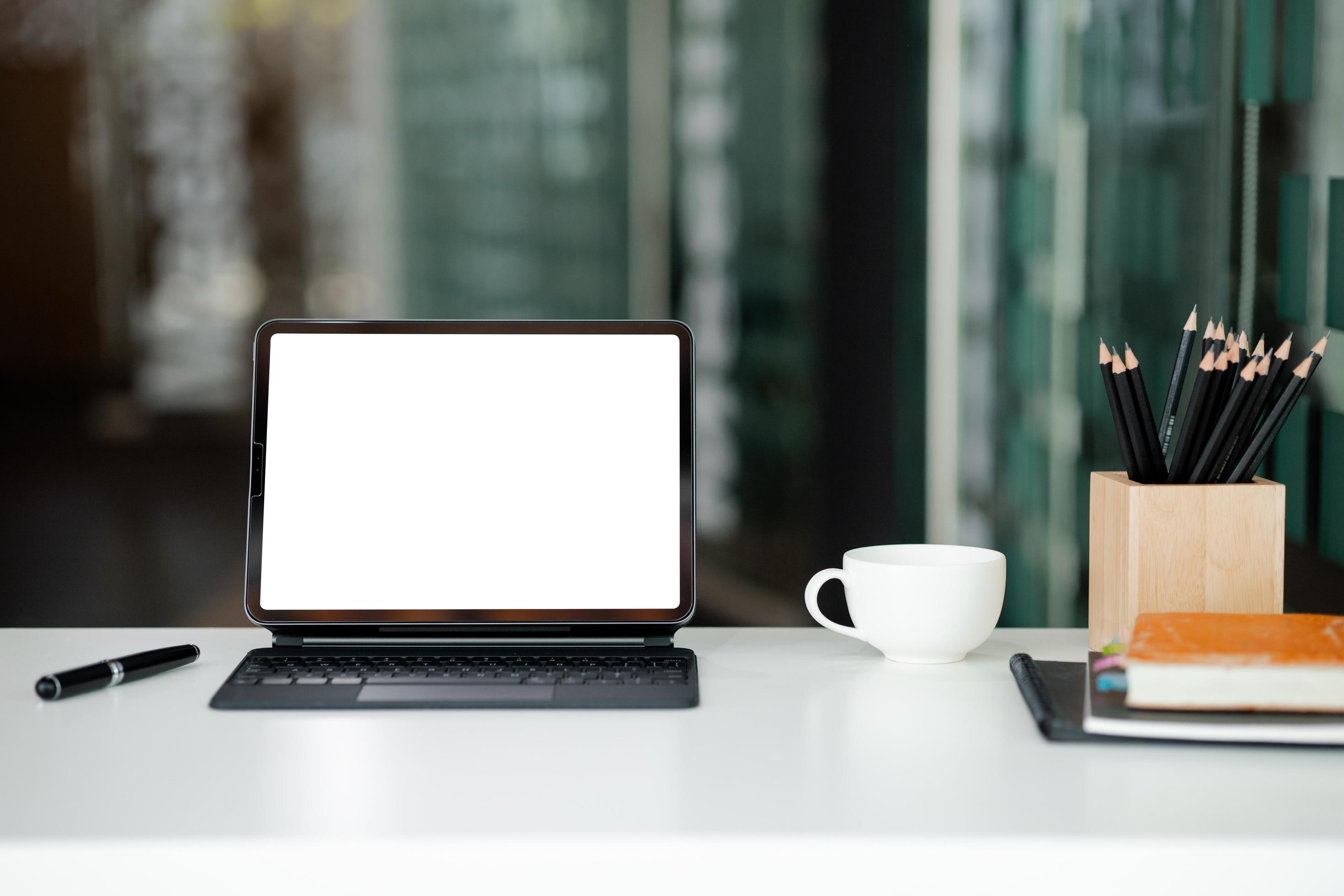 startup company desk, blank tablet screen, empty office, office room in ... startup company desk, blank tablet screen, empty office, office room in ...