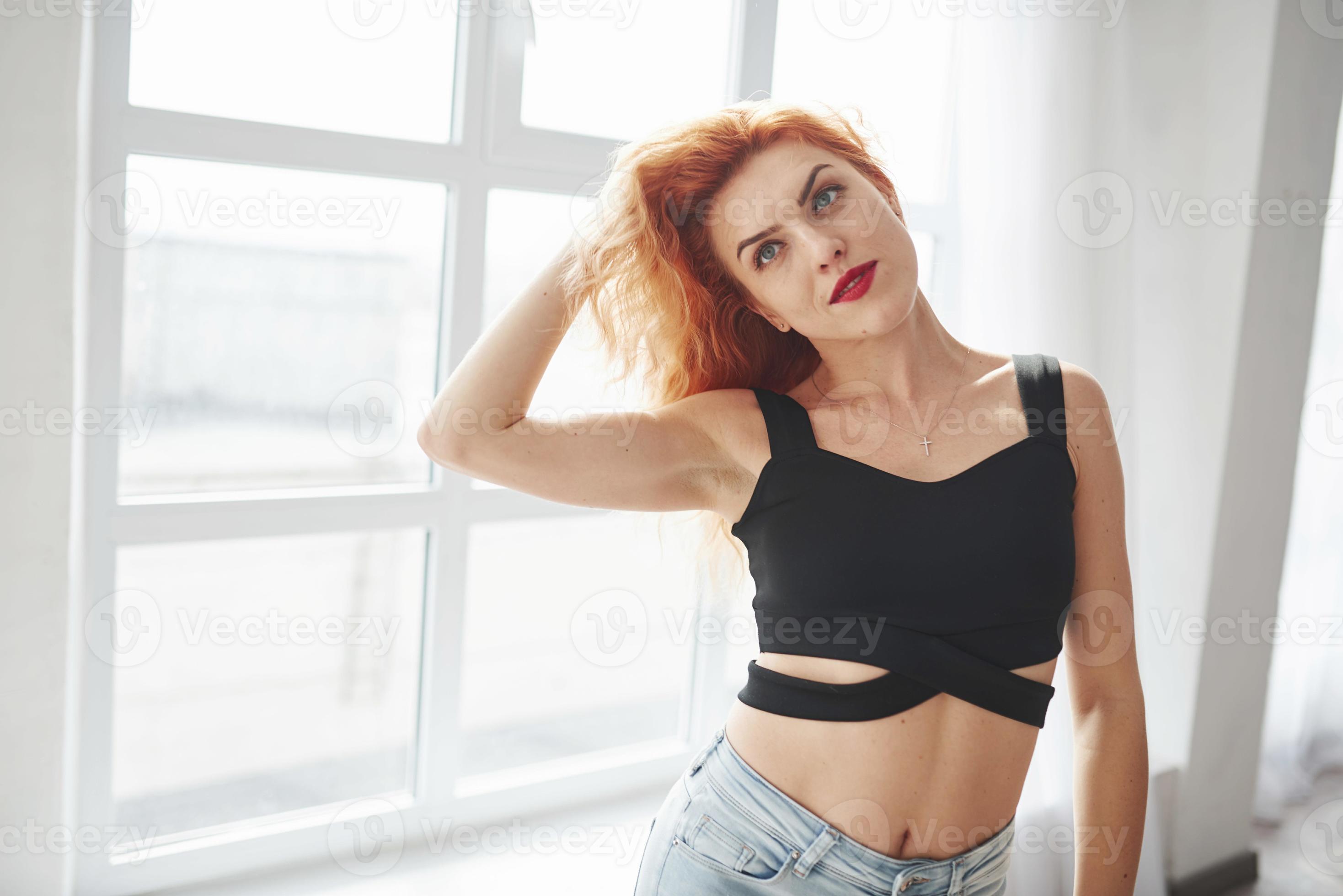 Dreamy Look Attractive Redhead Woman Posing In The Spacey Room Near The Window 8681294 Stock