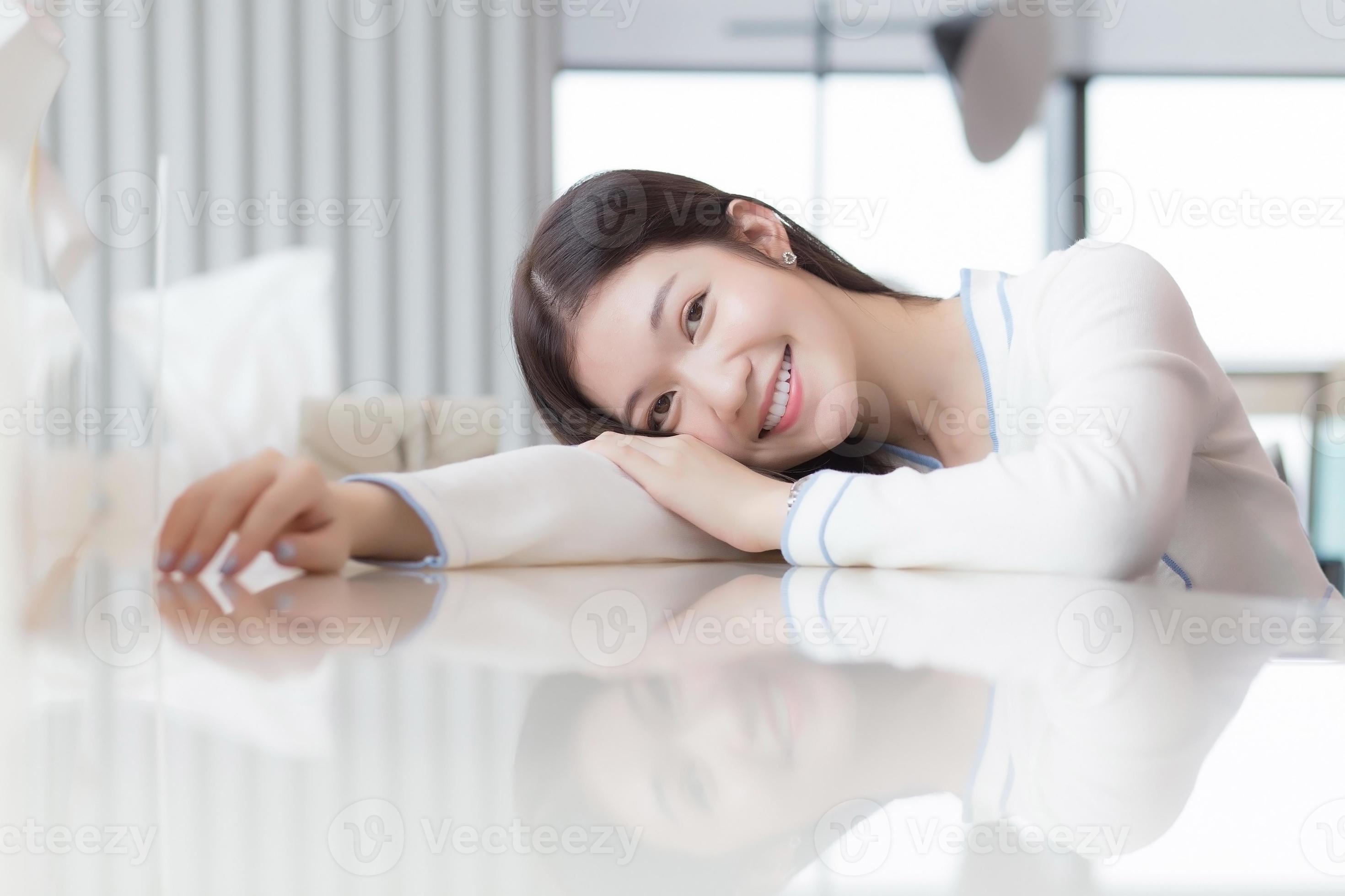 Portrait of cheerful beautiful young female is feeling happy and smile ...