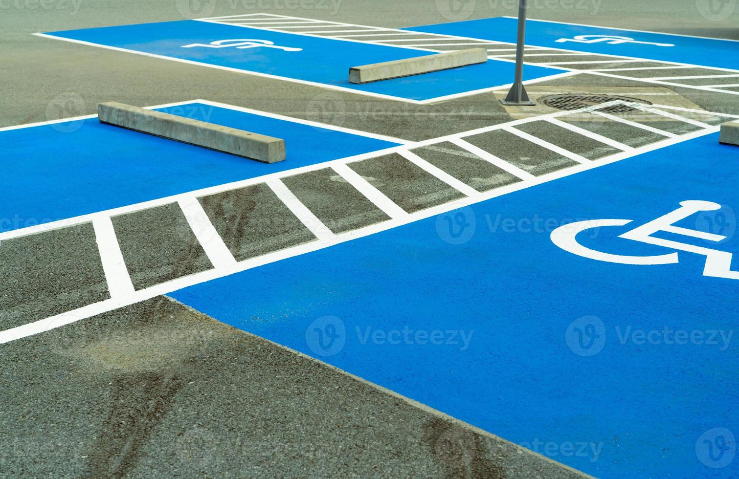 Asphalt car parking lot reserved for handicapped driver in supermarket ... Asphalt car parking lot reserved for handicapped driver in supermarket ...