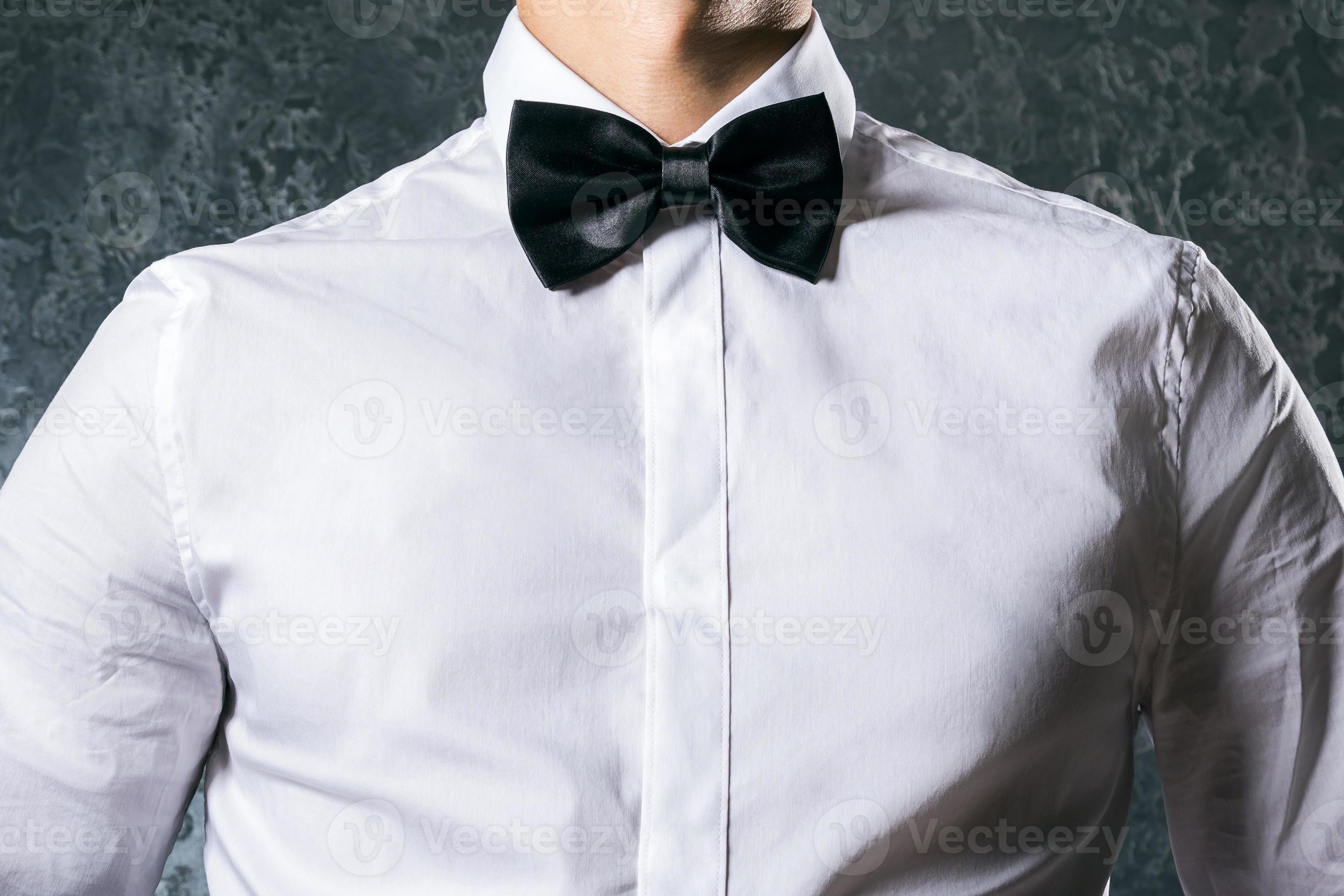 Man wearing bow tie 8862570 Stock Photo at Vecteezy