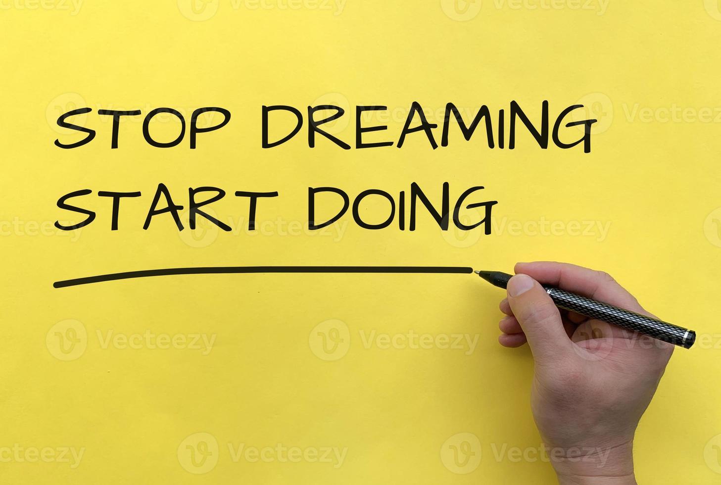 Stop dreaming start doing text on yellow background. 8951179 Stock Photo at Vecteezy