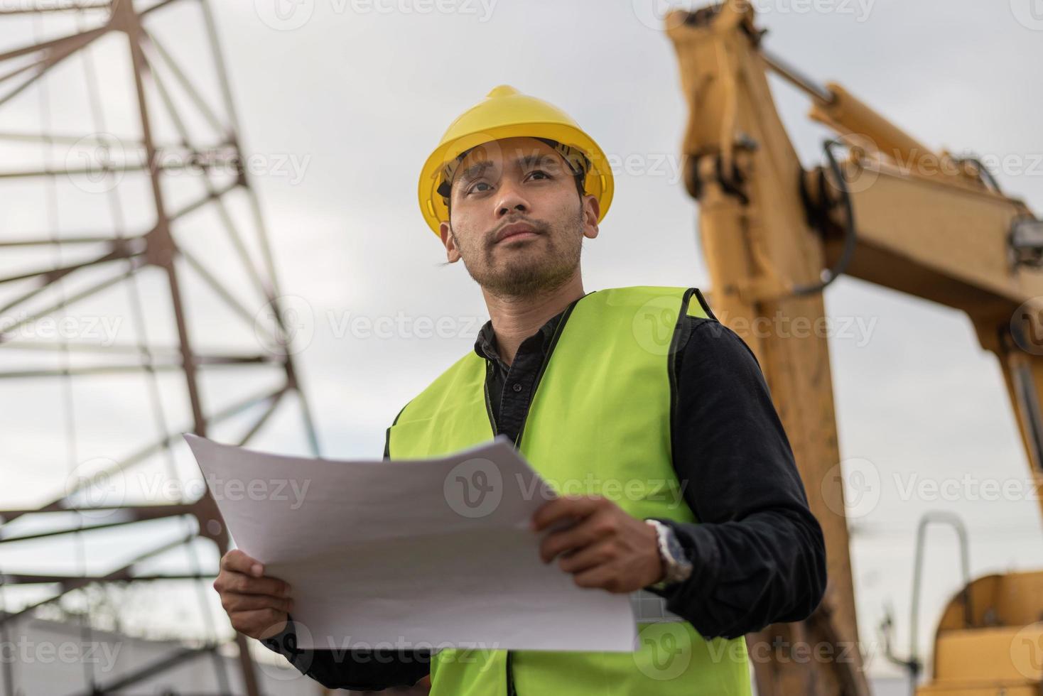 engineer man working in building site. Young Worker man working in ... engineer man working in building site. Young Worker man working in ...