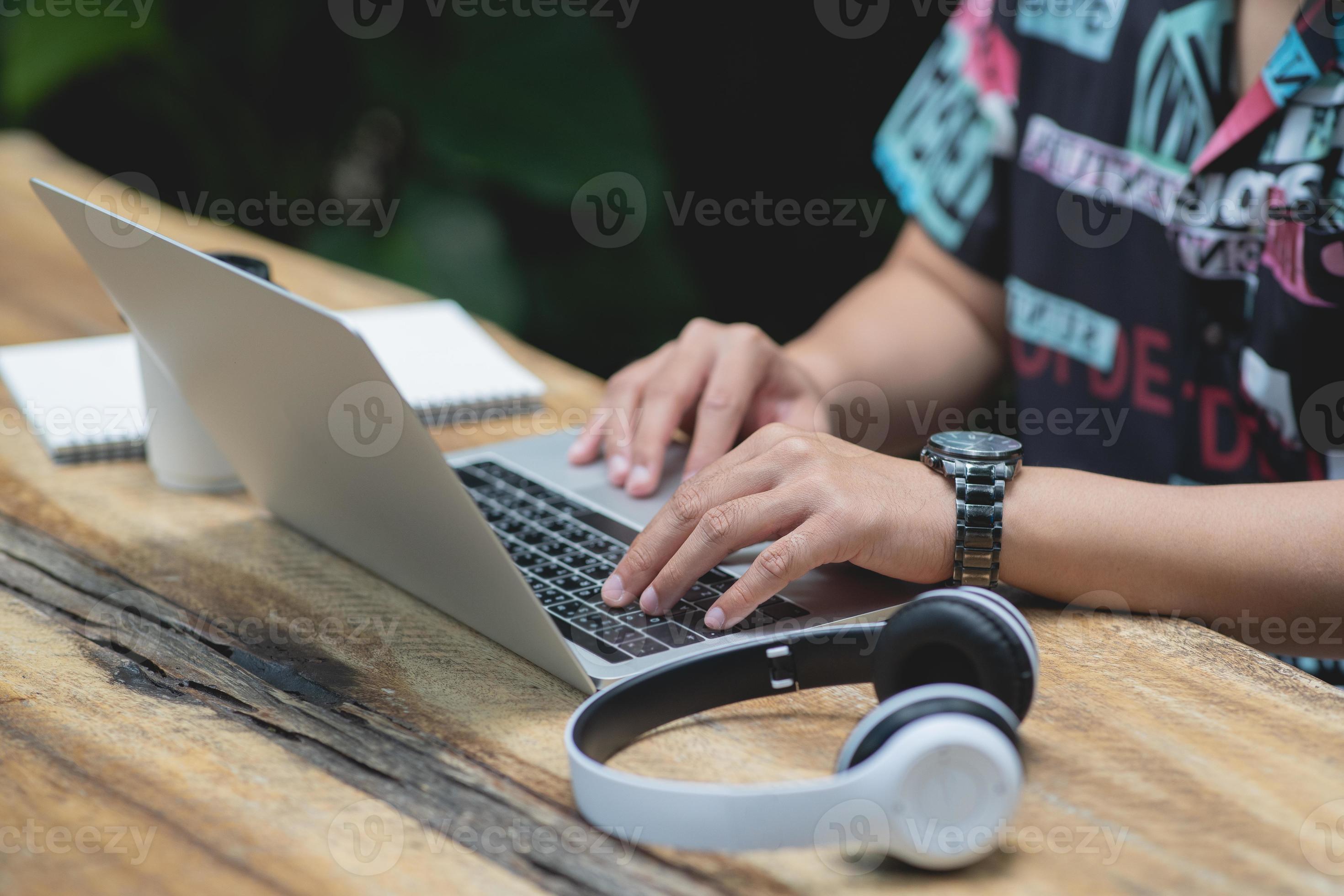 freelance man working on laptop in the cafe. Man developer programmer ...