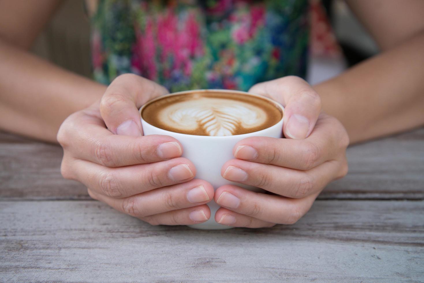 woman hands holding Latte art, coffee cup. 9295157 Stock Photo at Vecteezy