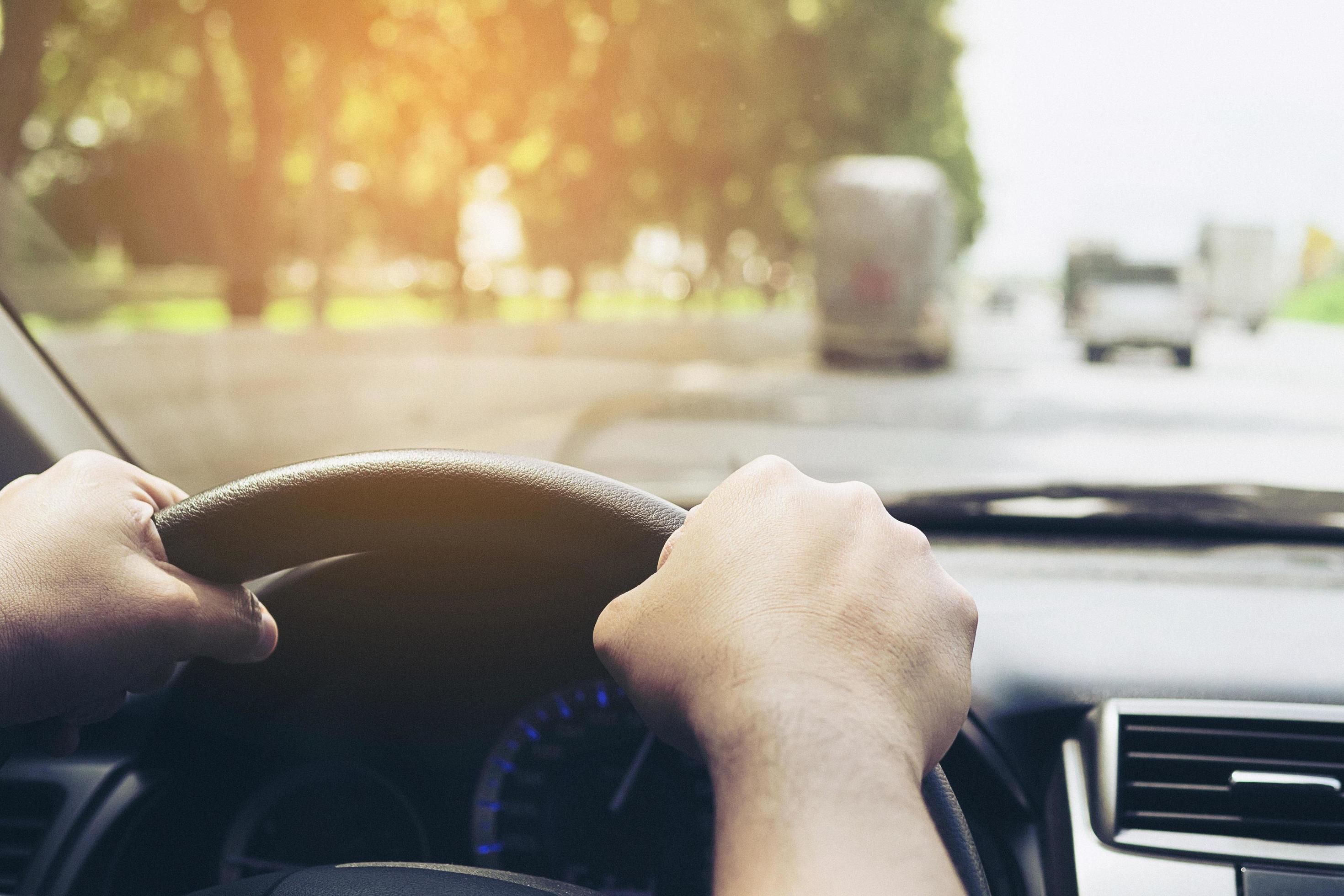 Close up of a man driving car using two hands 9309646 Stock Photo at ...